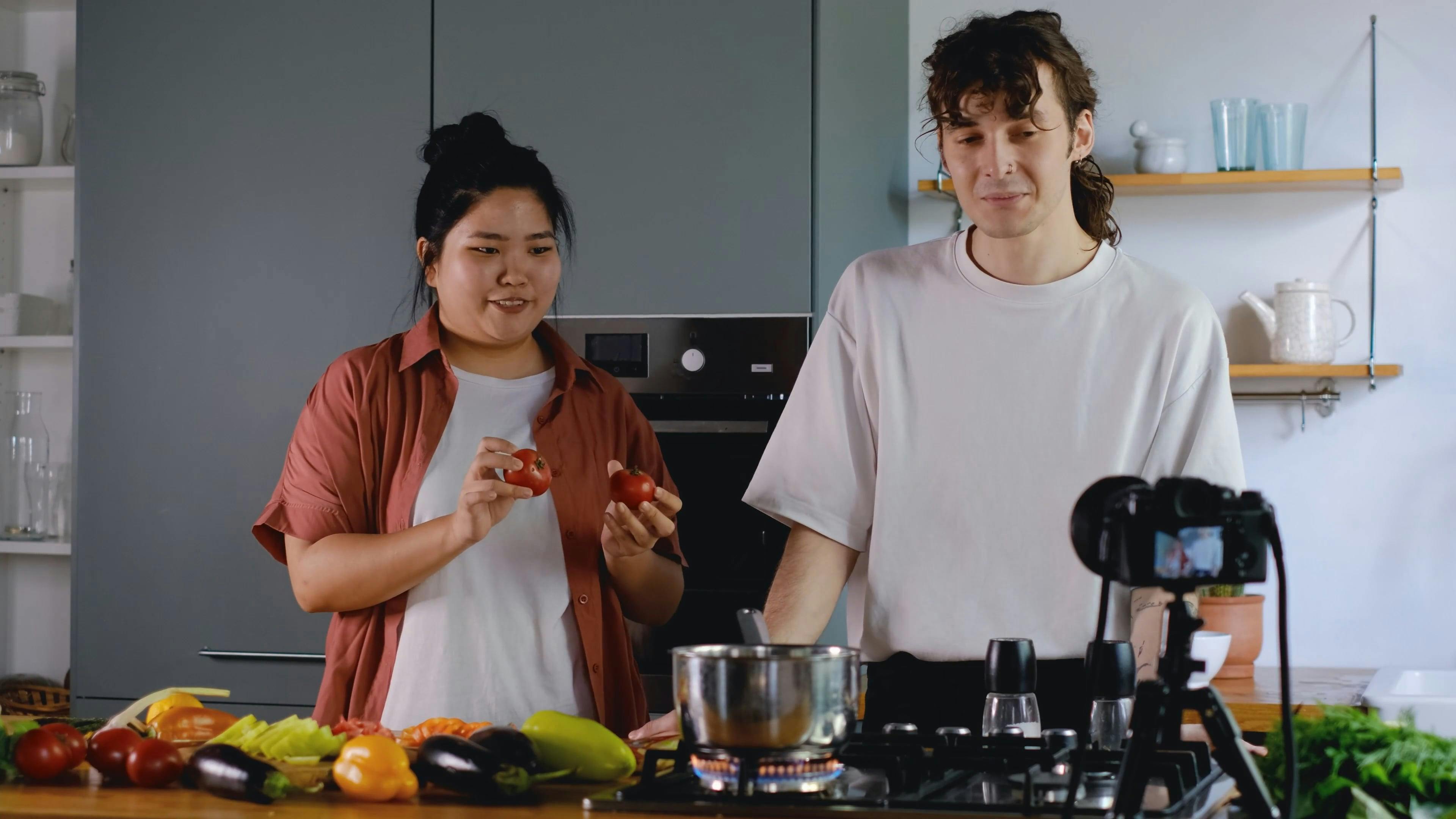 Food Vloggers Explaining a Recipe and Showing Ingredients Free Stock ...