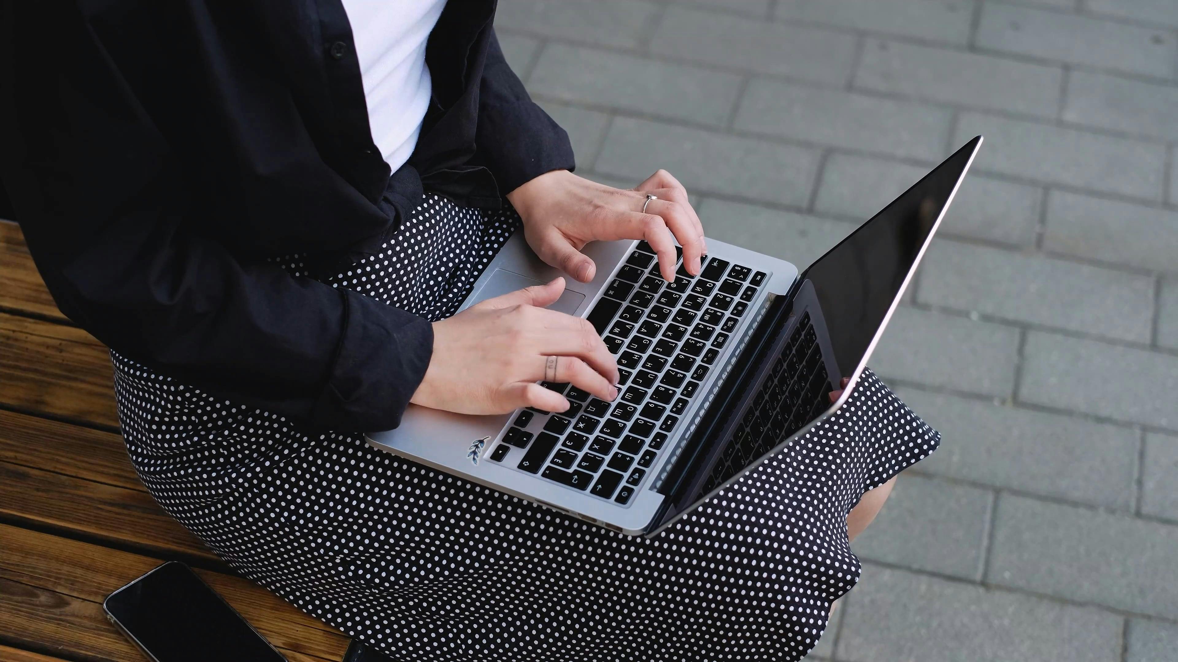 A Person Using a Laptop Computer while Travelling on a Train Free Stock ...