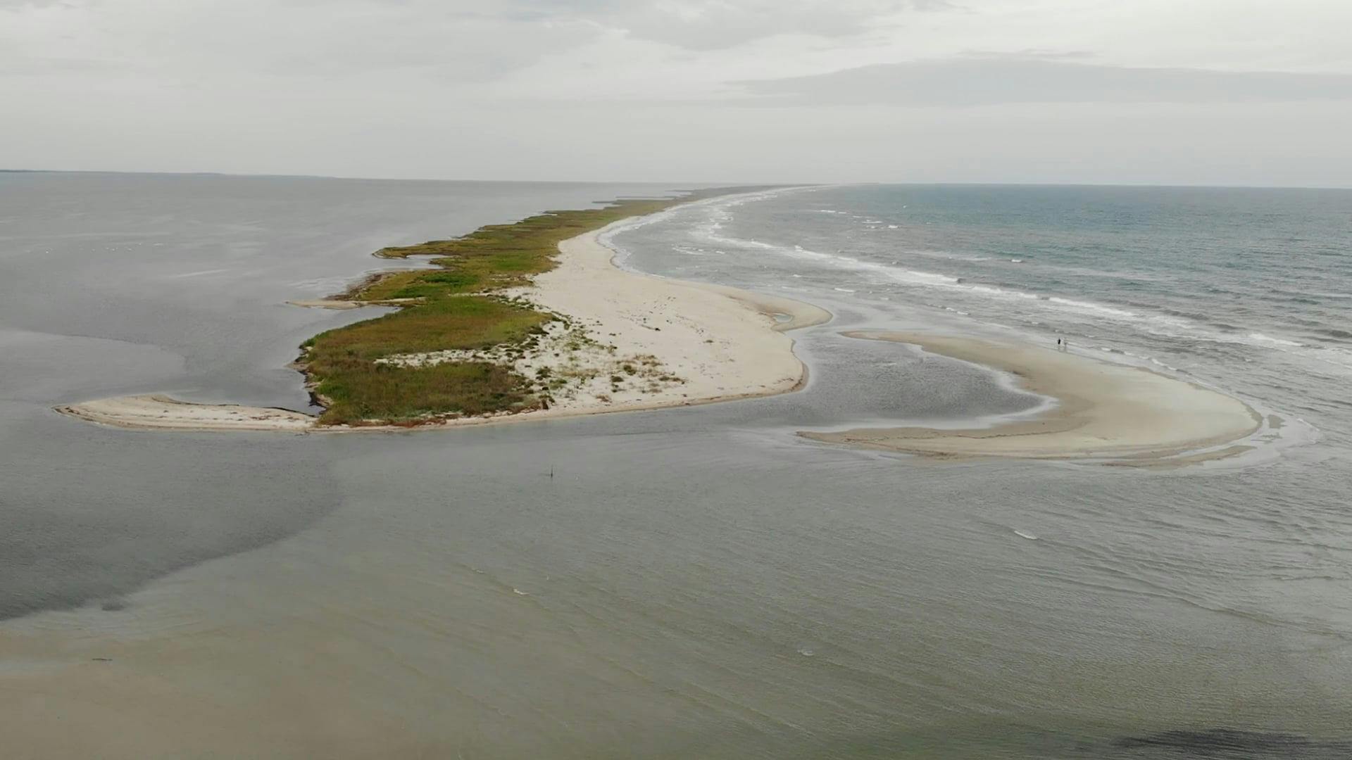 Drone Footage of a Narrow Island with Sandy Beaches Free Stock Video ...