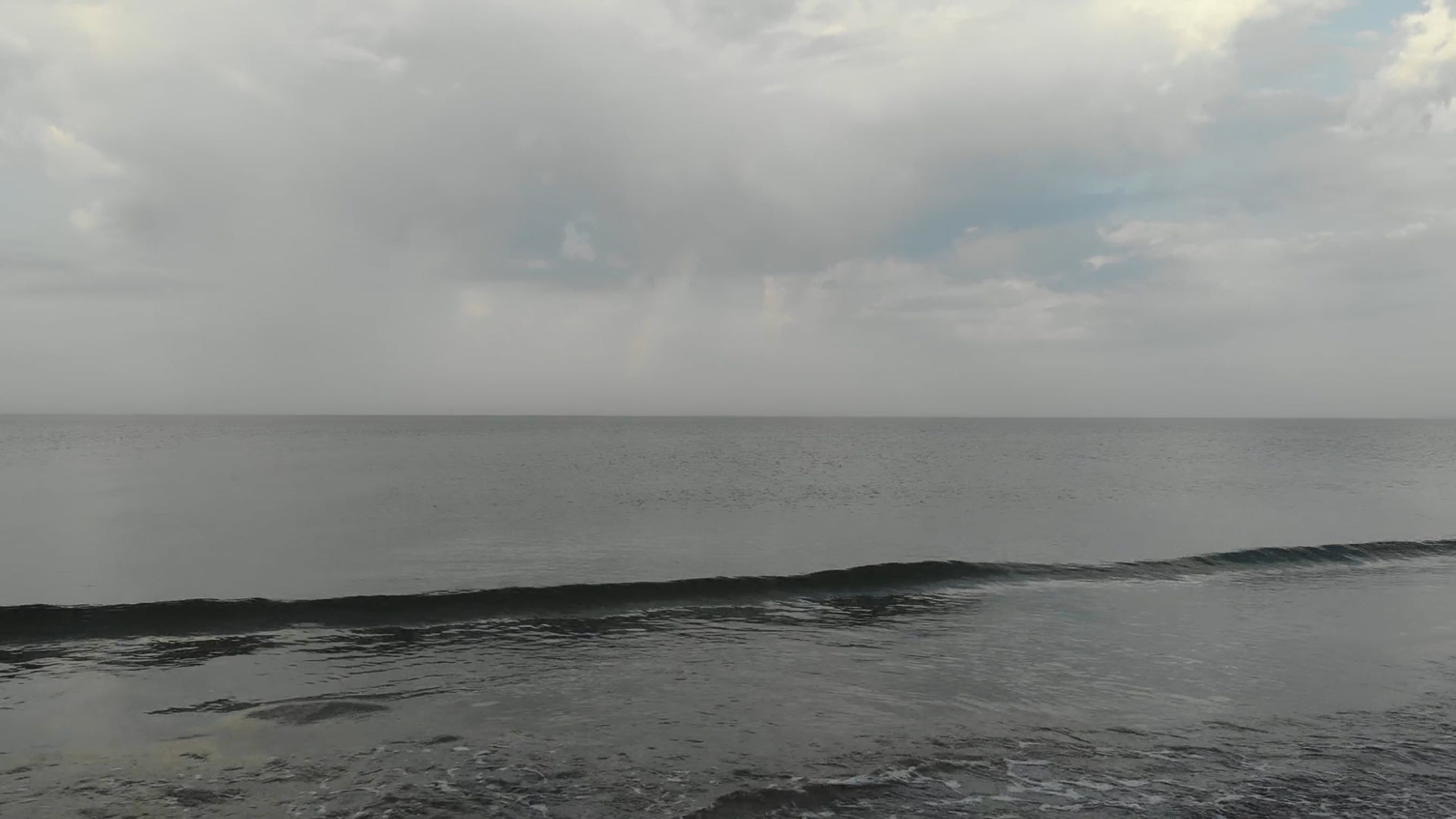 Drone Video of Calm Sea Waters under a Cloudy Sky Free Stock Video ...