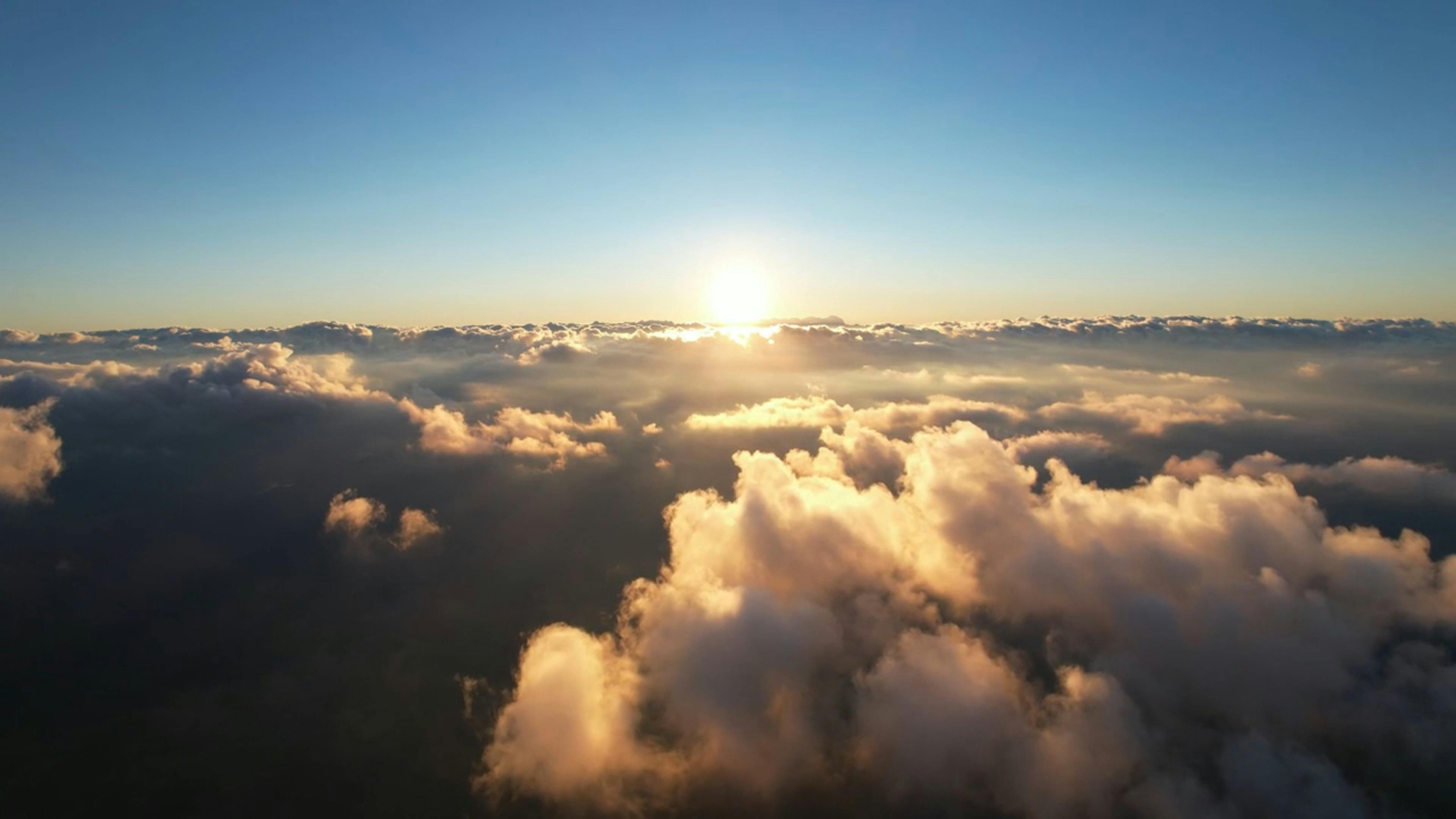 Sun over Clouds Free Stock Video Footage, Royalty-Free 4K & HD Video Clip