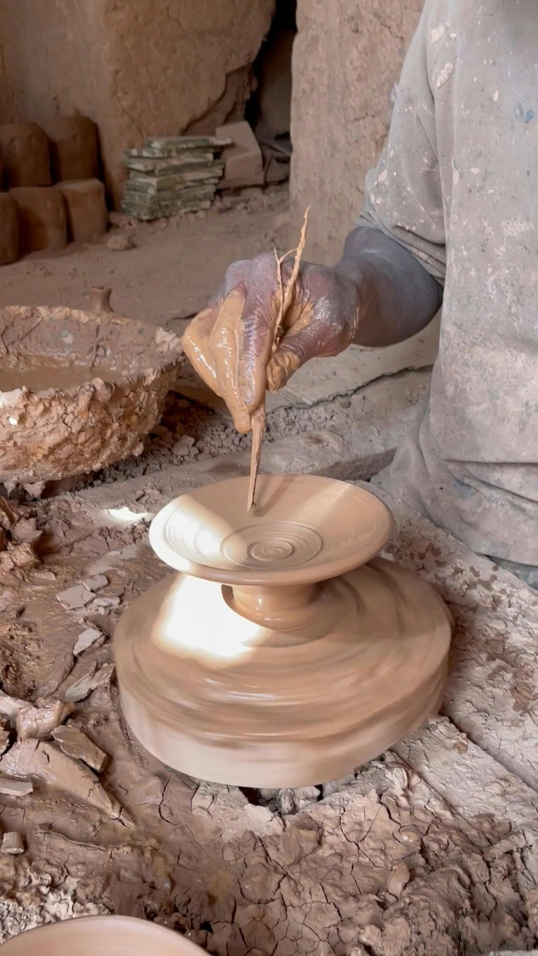 An Artisan Making a Plate on the Pottery Wheel Free Stock Video Footage ...