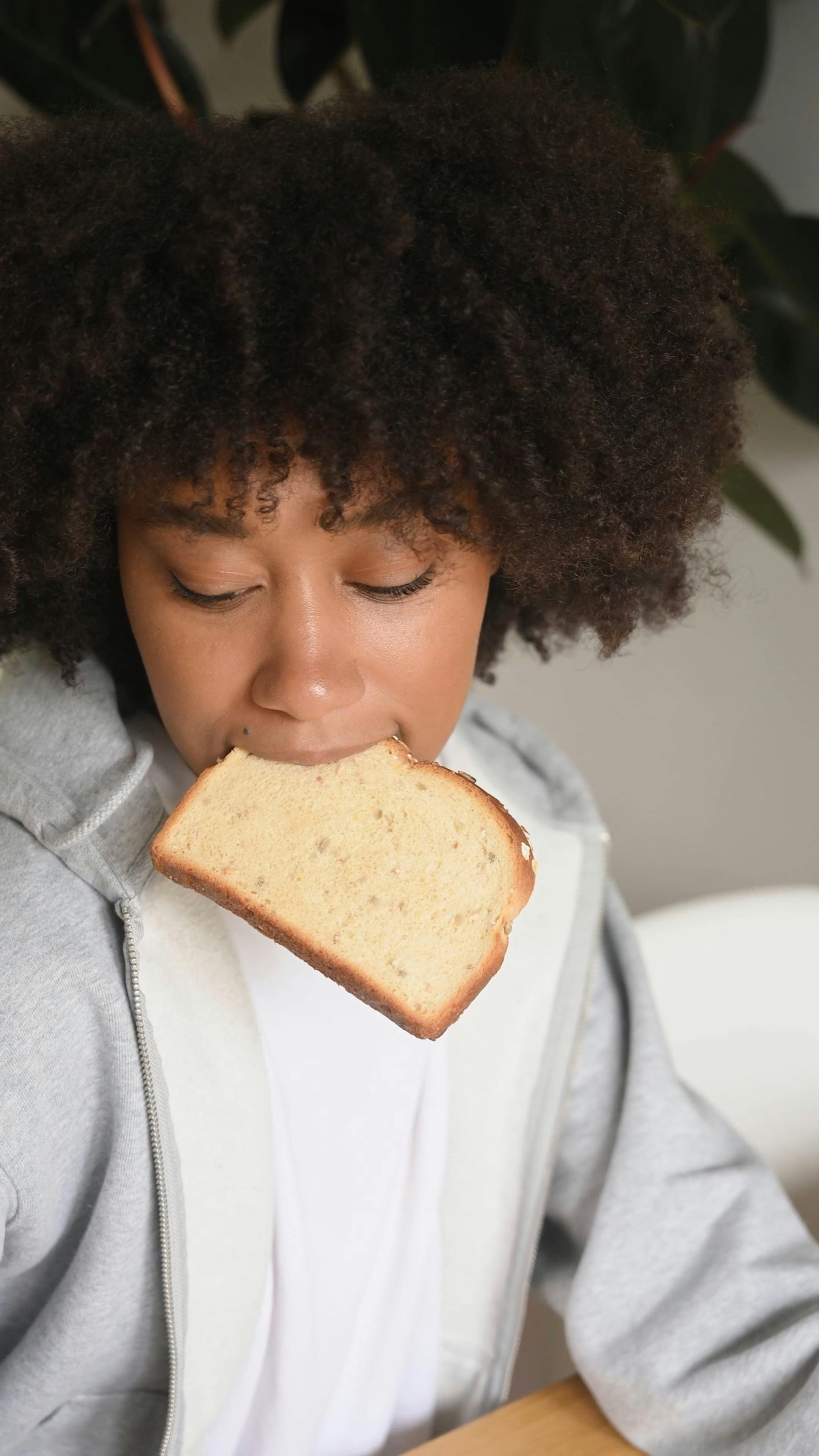 Woman Holding Bread in Mouth Free Stock Video Footage, Royalty-Free 4K ...