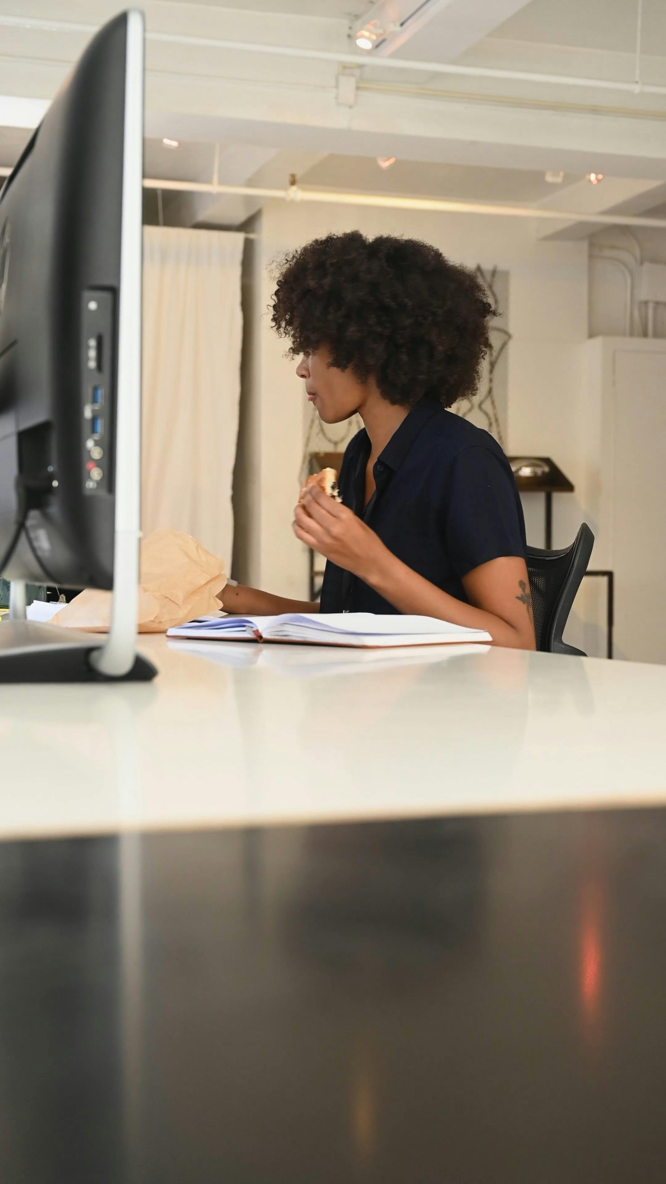 Woman Eating while Working Free Stock Video Footage, Royalty-Free 4K ...