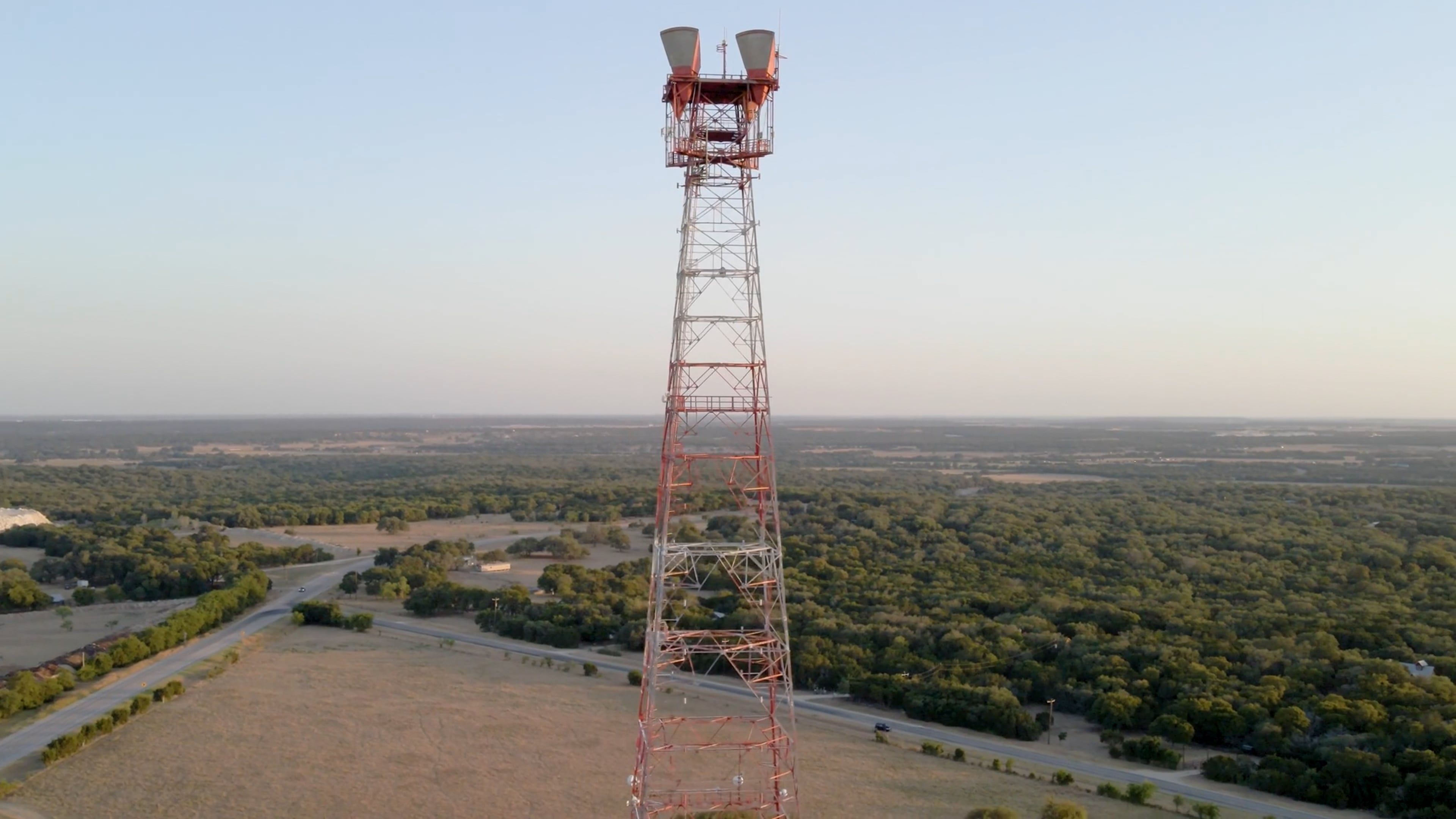 Aerial View of Communication Tower Over Town Free Stock Video Footage ...