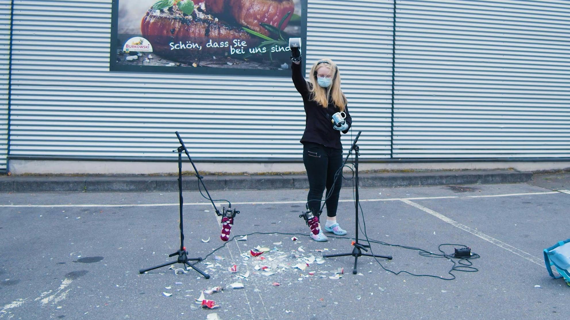 A Woman Breaking Ceramic Mugs and Recording the Sound Free Stock Video ...