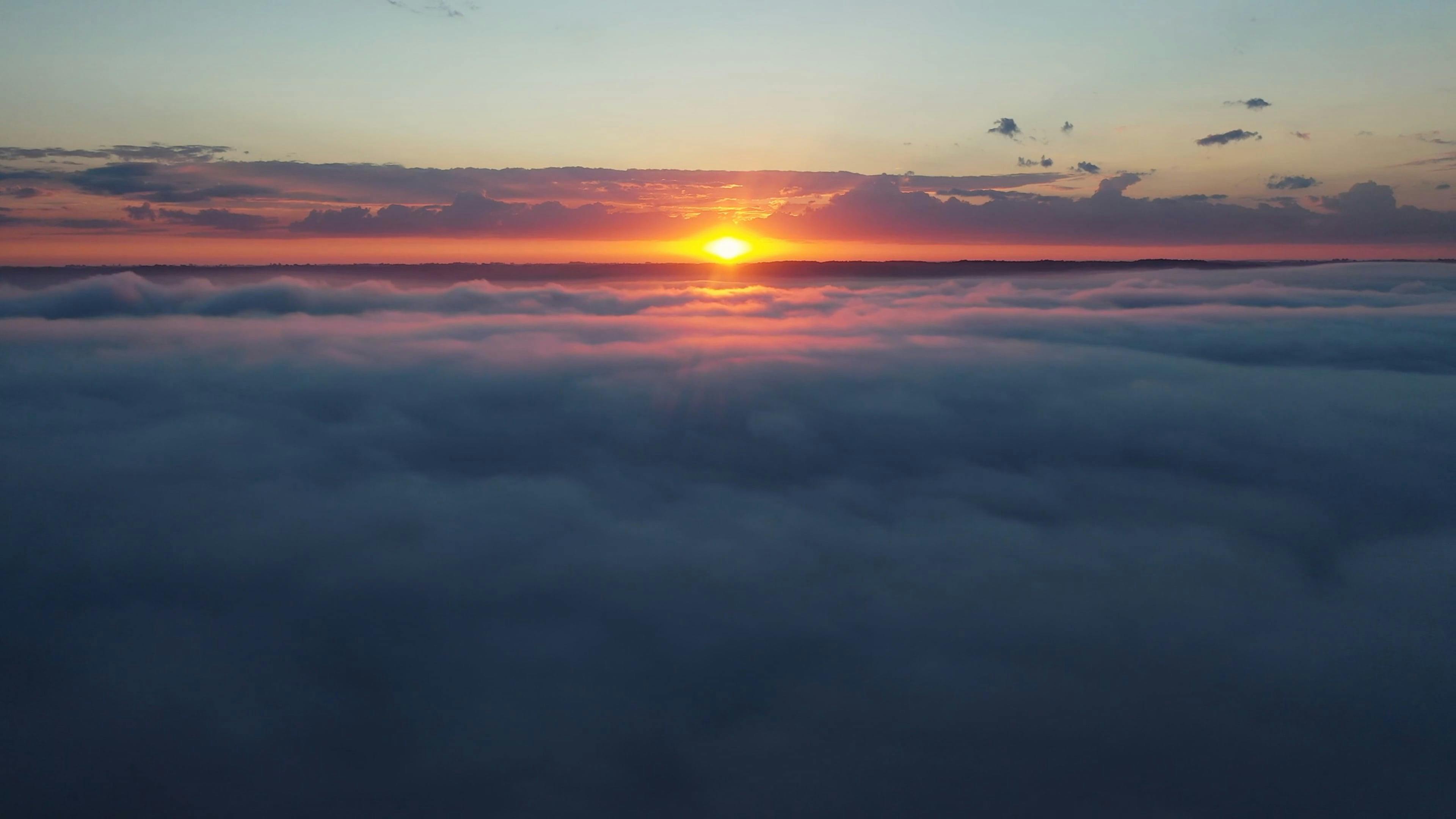 Sun over Clouds Free Stock Video Footage, Royalty-Free 4K & HD Video Clip