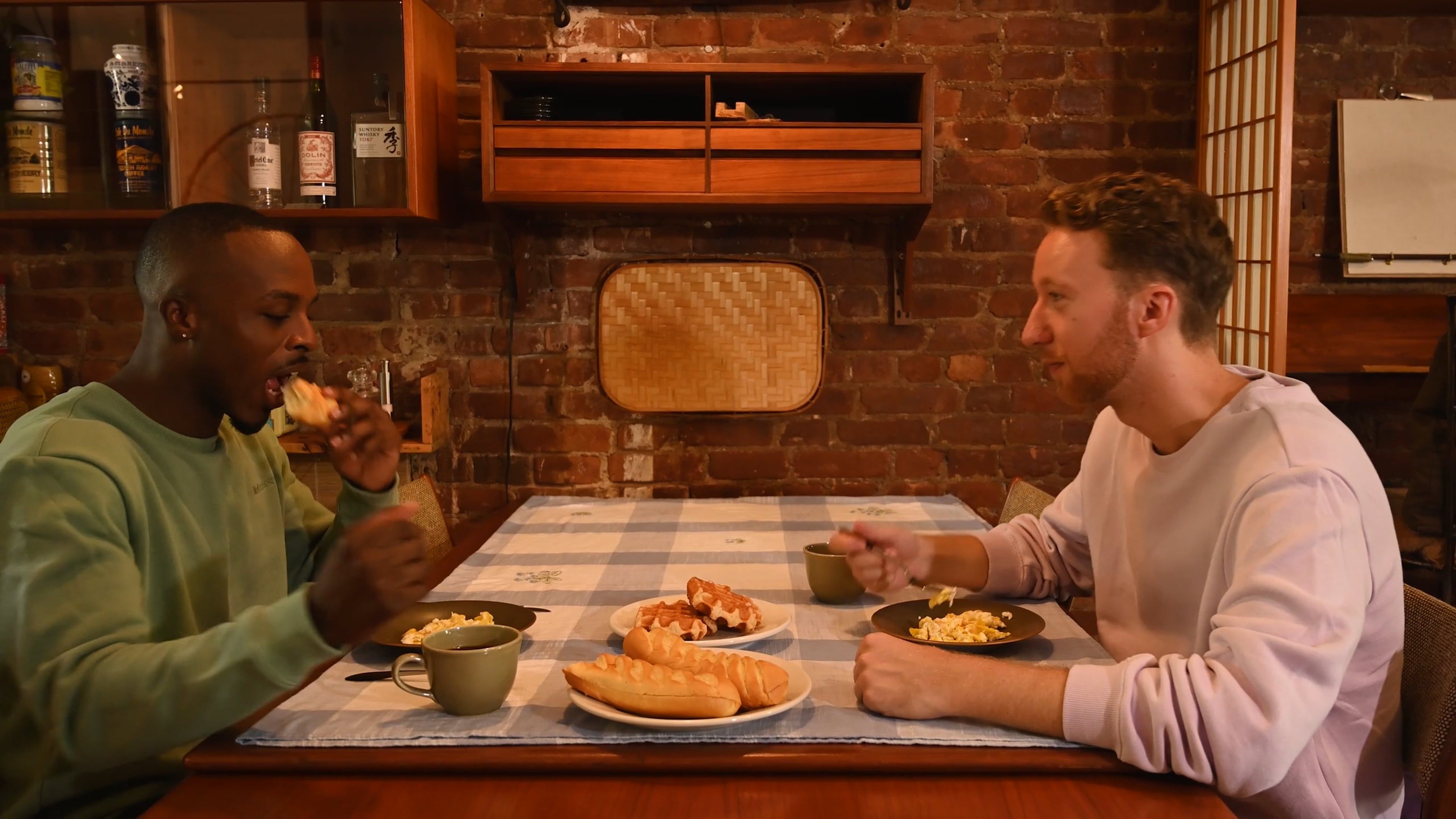 Two Young Men Eating Breakfast Together Free Stock Video Footage ...