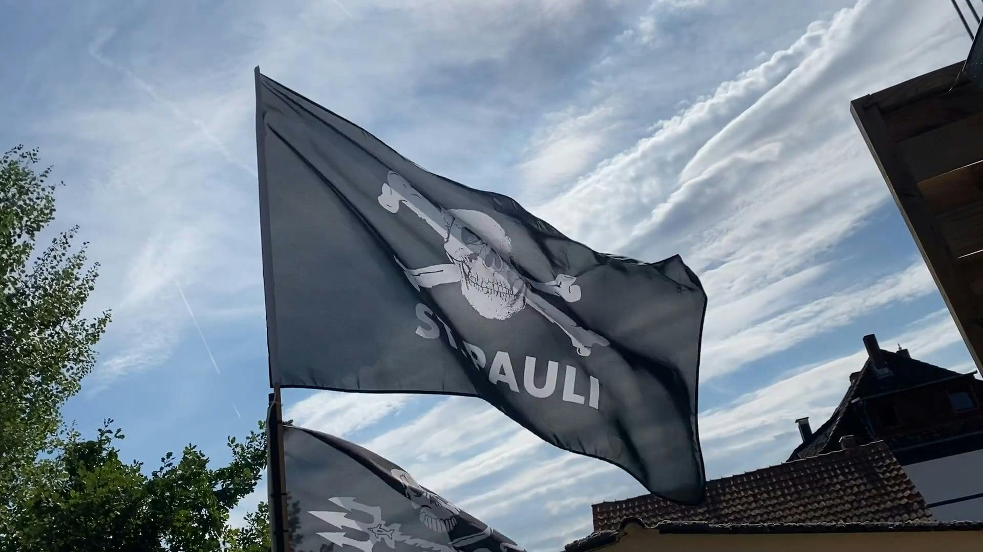 A St. Pauli Football Club Flag Waving on a Pole Free Stock Video ...