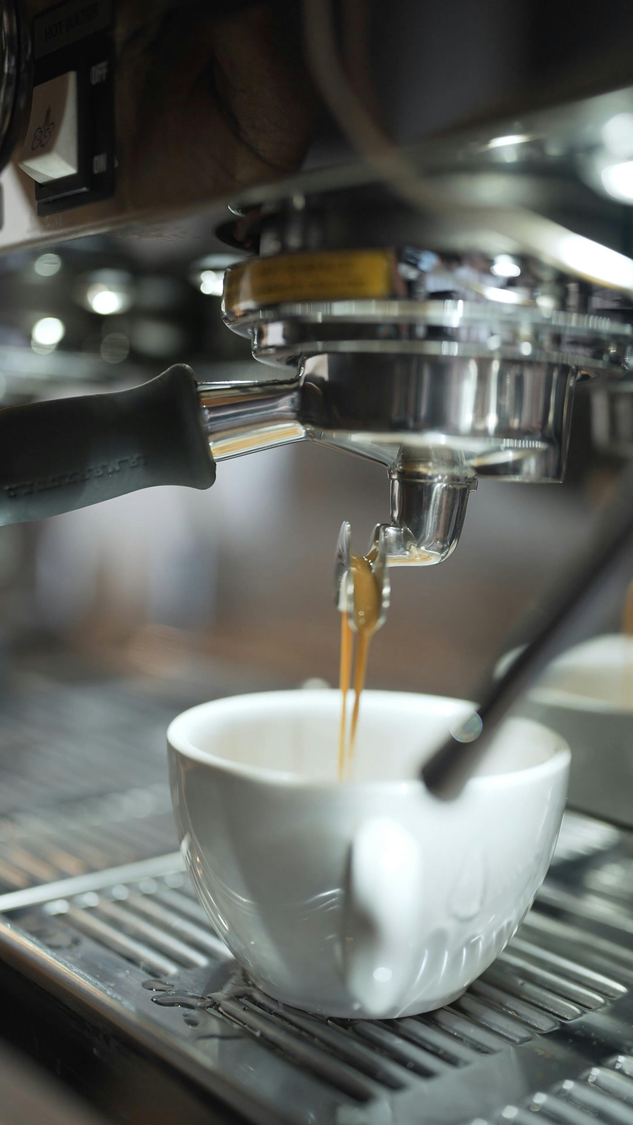 A Coffee Dripping in a Cup from the Coffee Maker Free Stock Video ...