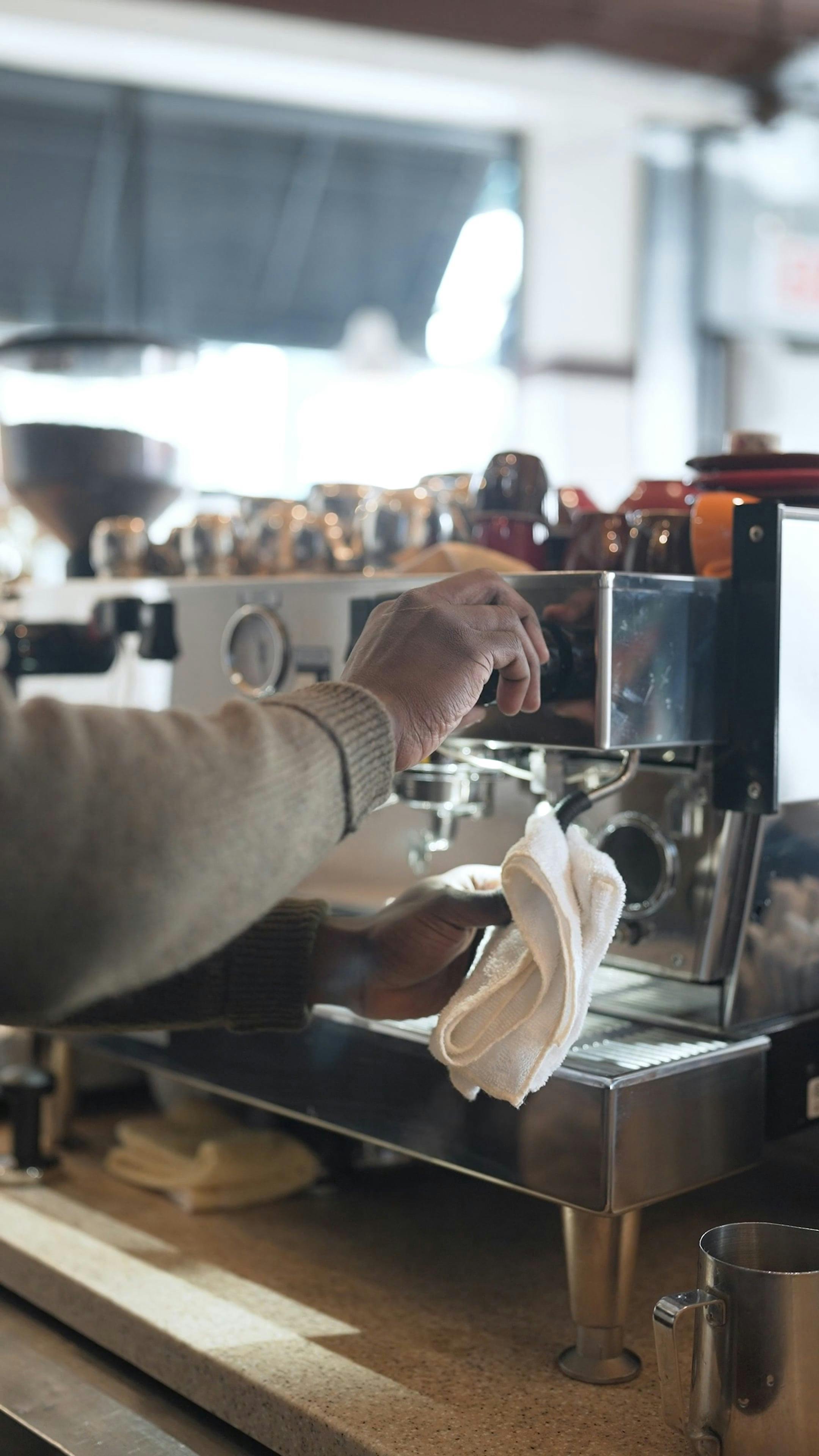 An Espresso Machine Dripping Coffee into a Ceramic Cup Free Stock Video ...