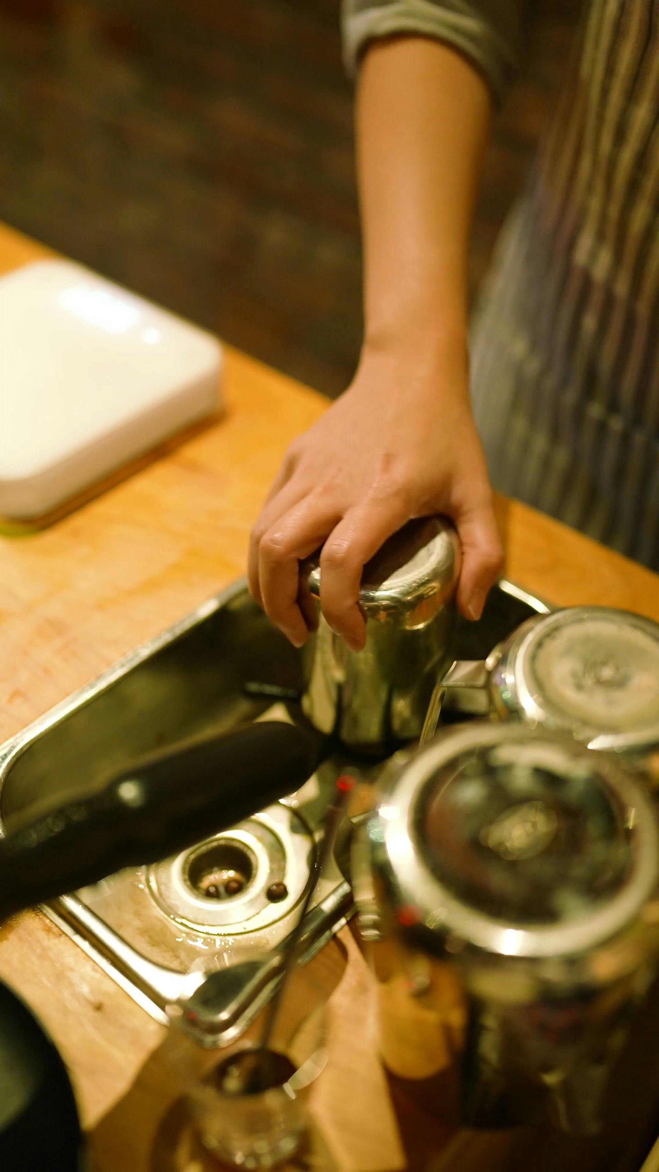 High Angle View of a Barista Rinsing a Milk Jug Free Stock Video ...