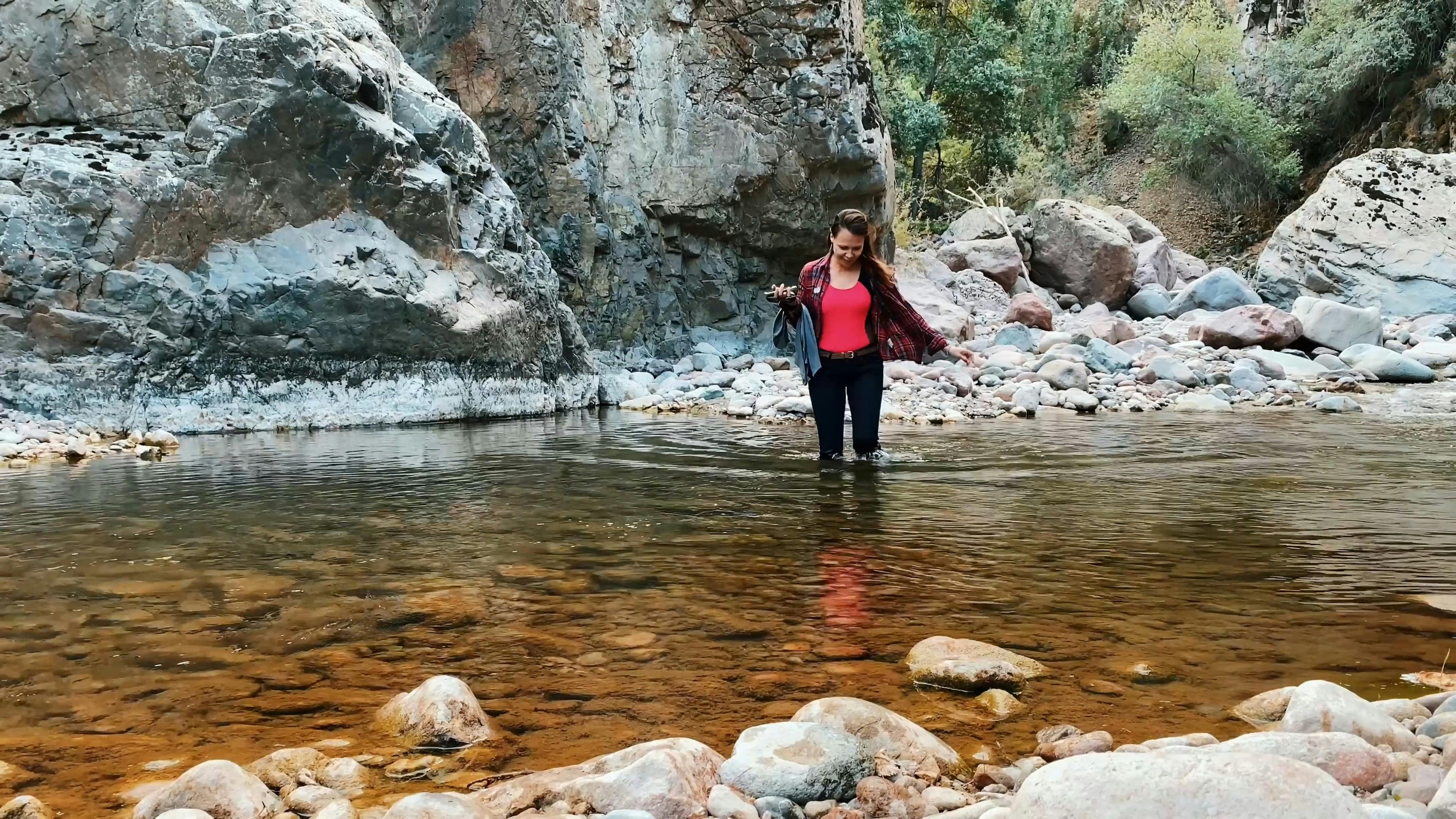 A Woman Walking on the River Free Stock Video Footage, Royalty-Free 4K ...