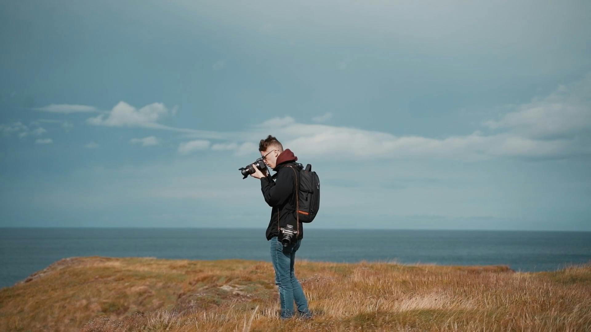 Man Taking Pictures on Sea Shore Free Stock Video Footage, Royalty-Free ...
