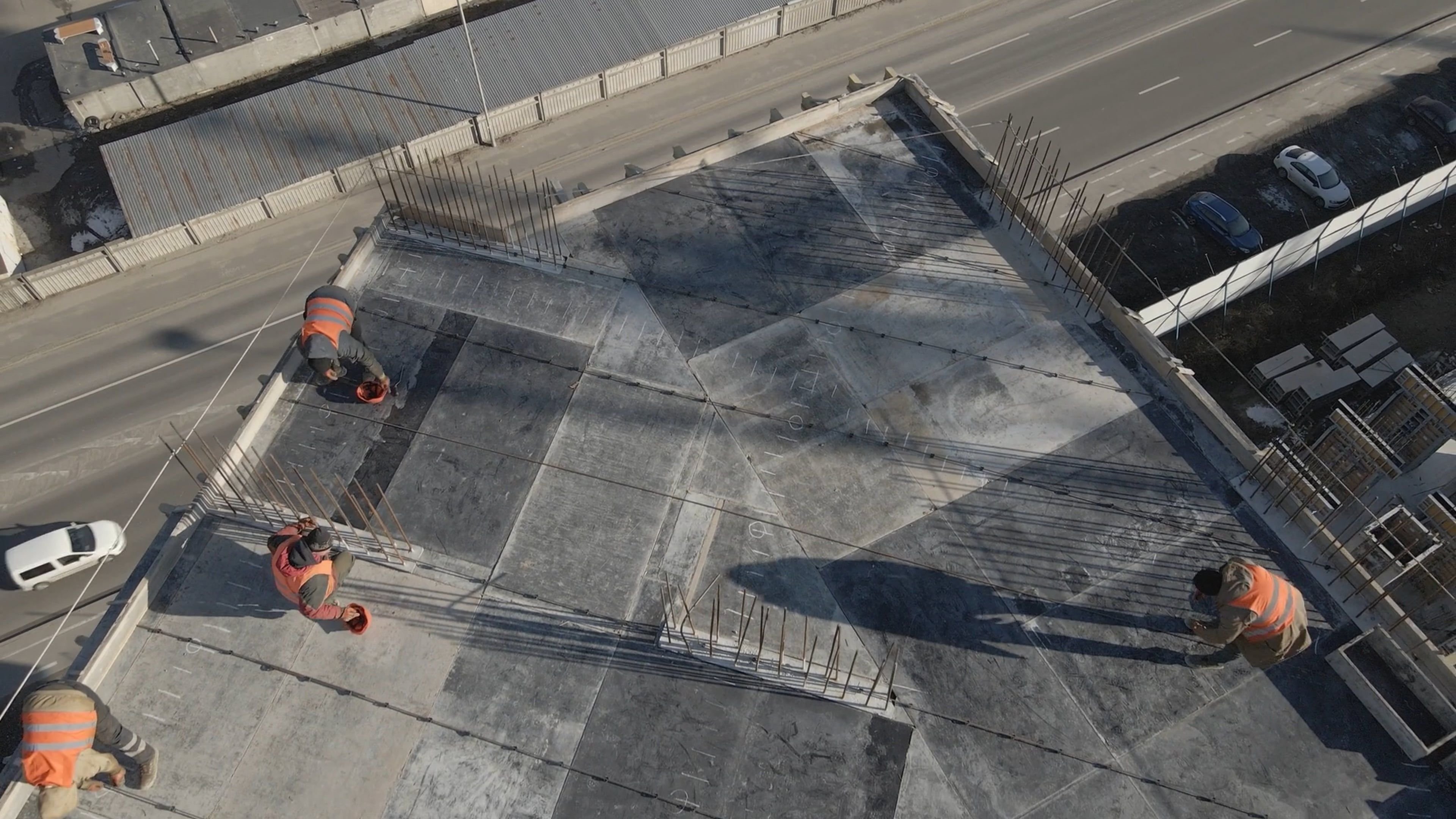 High Angle Shot of People Working on a Construction Site Free Stock ...