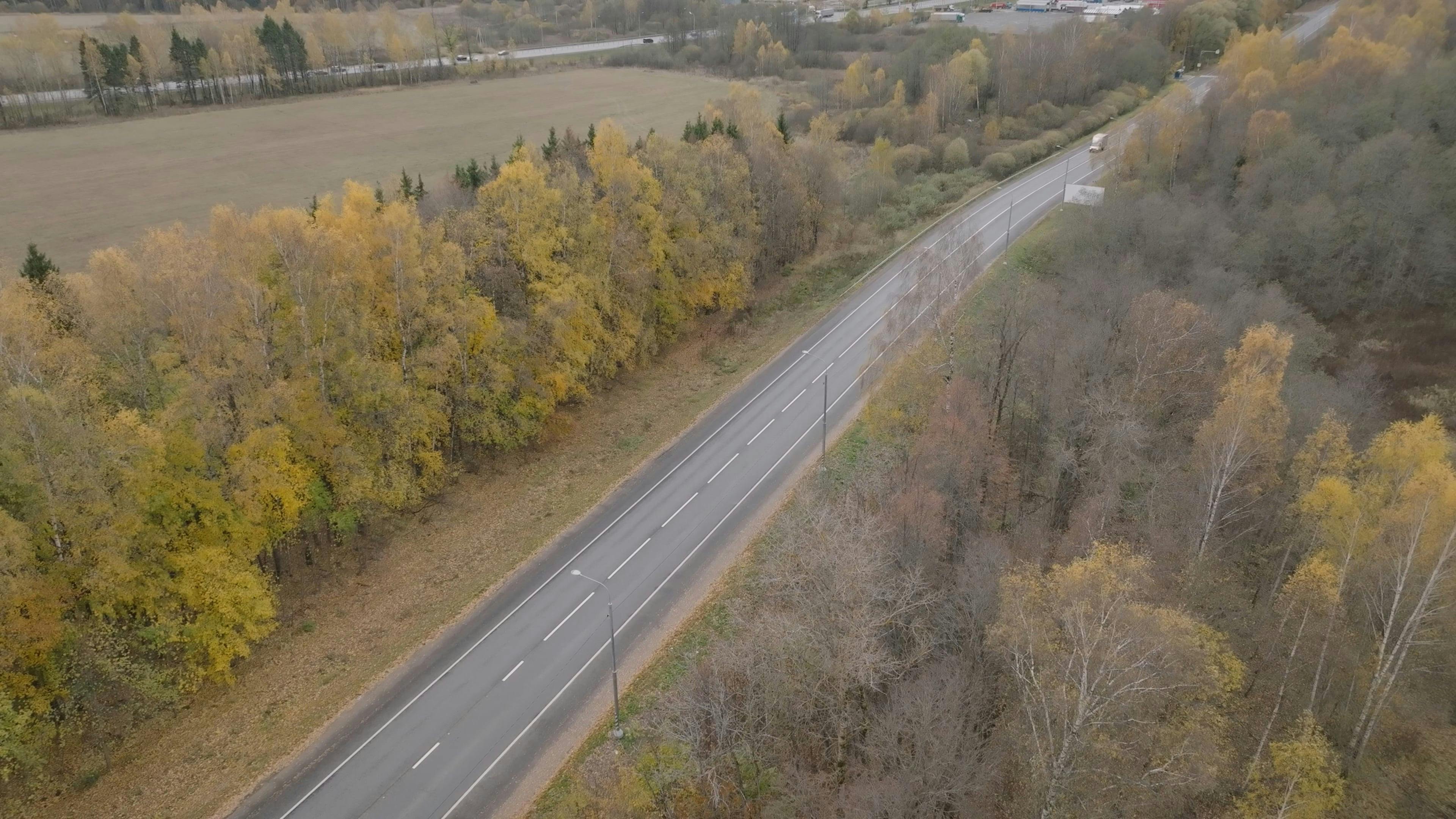 Drone Video of Countryside Roads with Autumn Trees on the Sides Free ...
