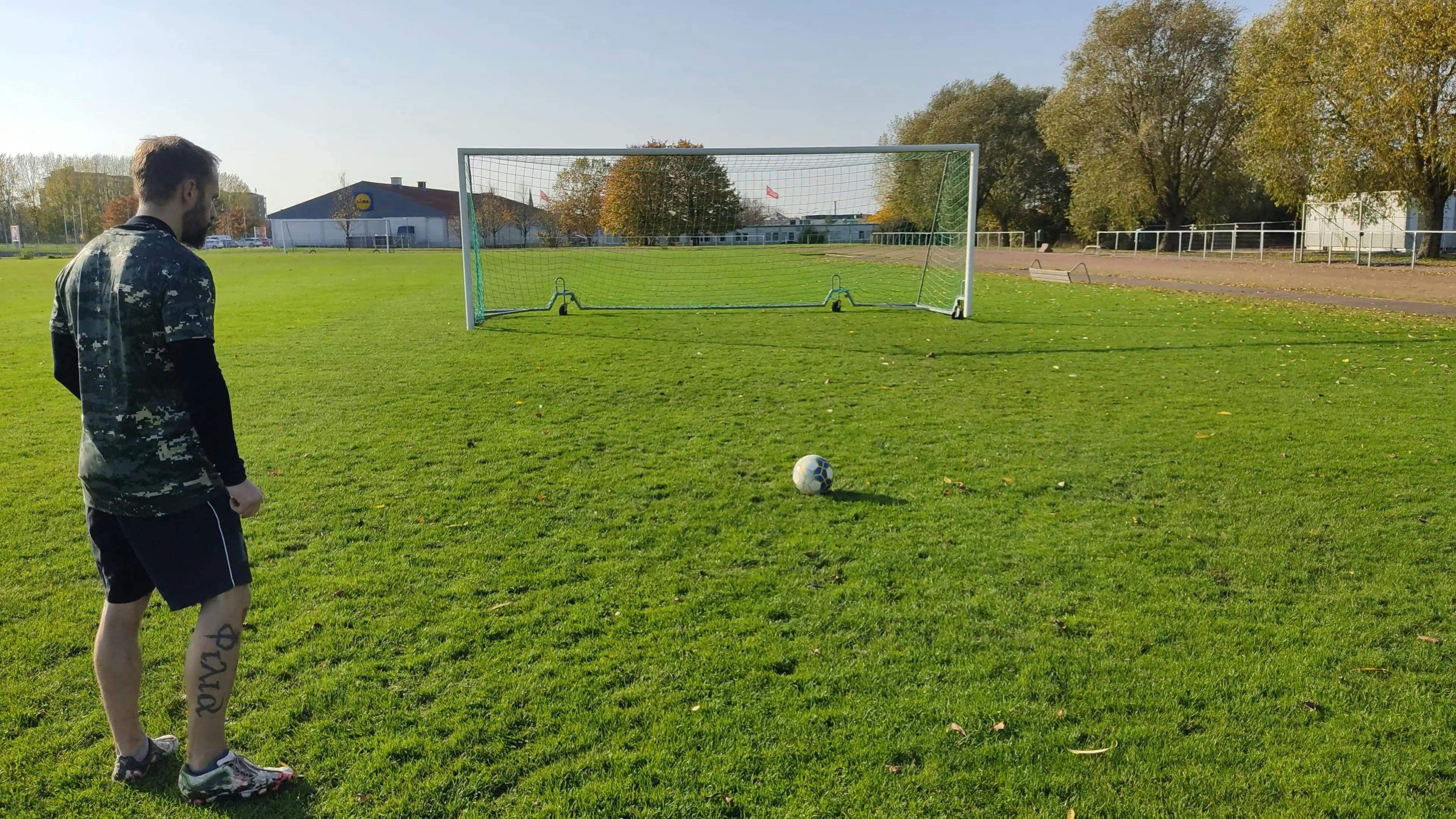 Back View of a Footballer Practising Penalty Kicks Free Stock Video ...