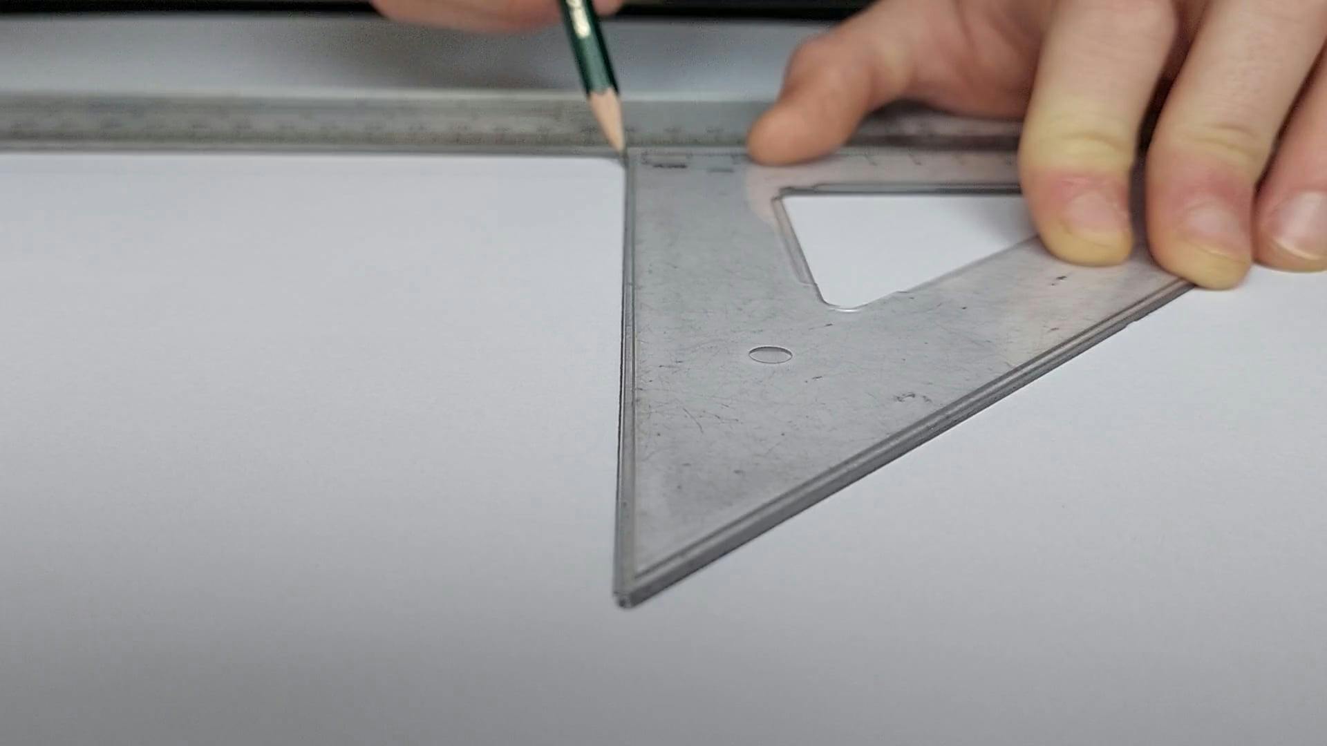 Person Drawing a Line Using a Ruler and Triangle Free Stock Video ...