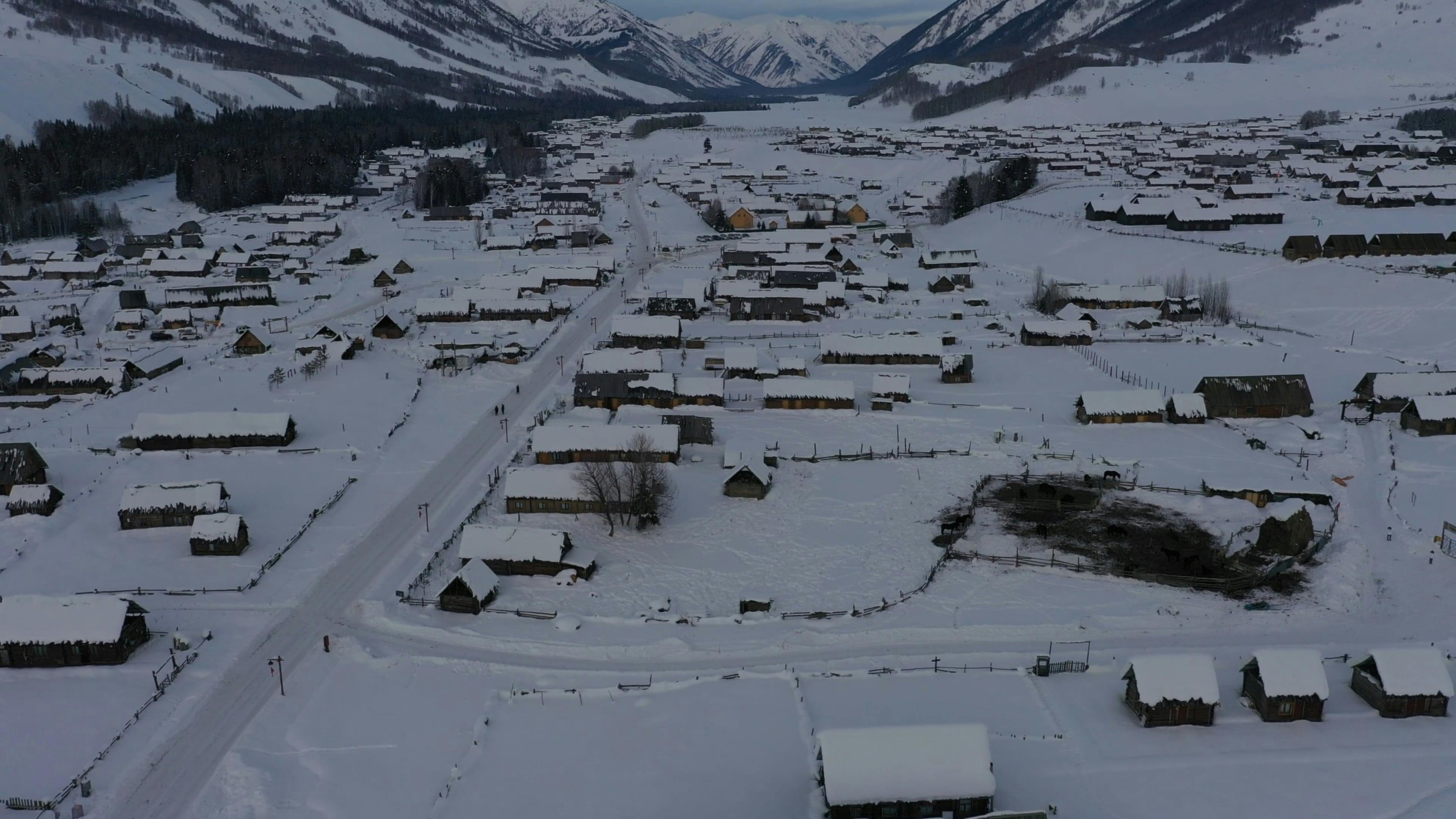 Drone Footage of a Mountain Village Covered in Snow Free Stock Video ...