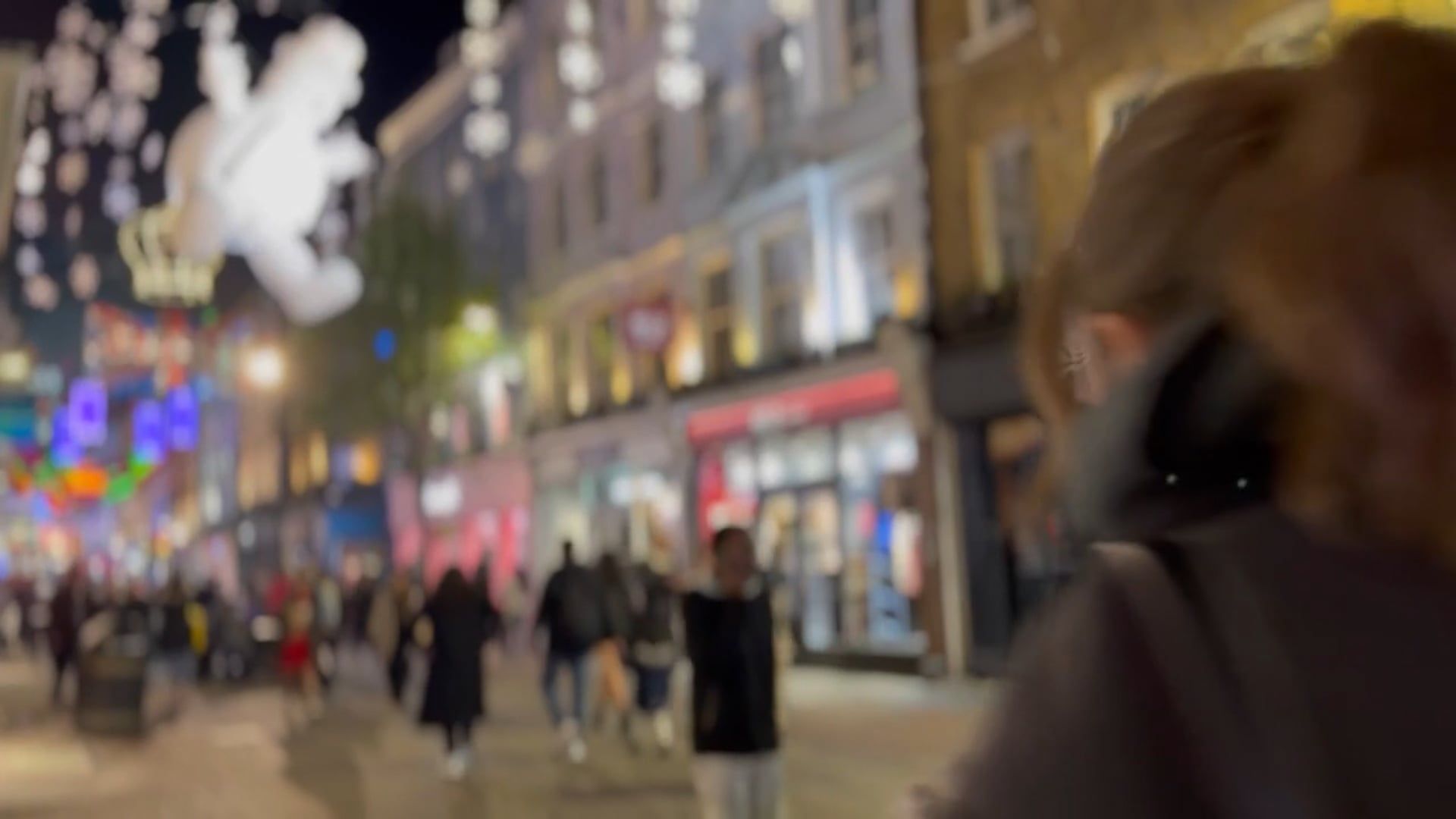 People Walking on Decorated Street at Night Free Stock Video Footage ...