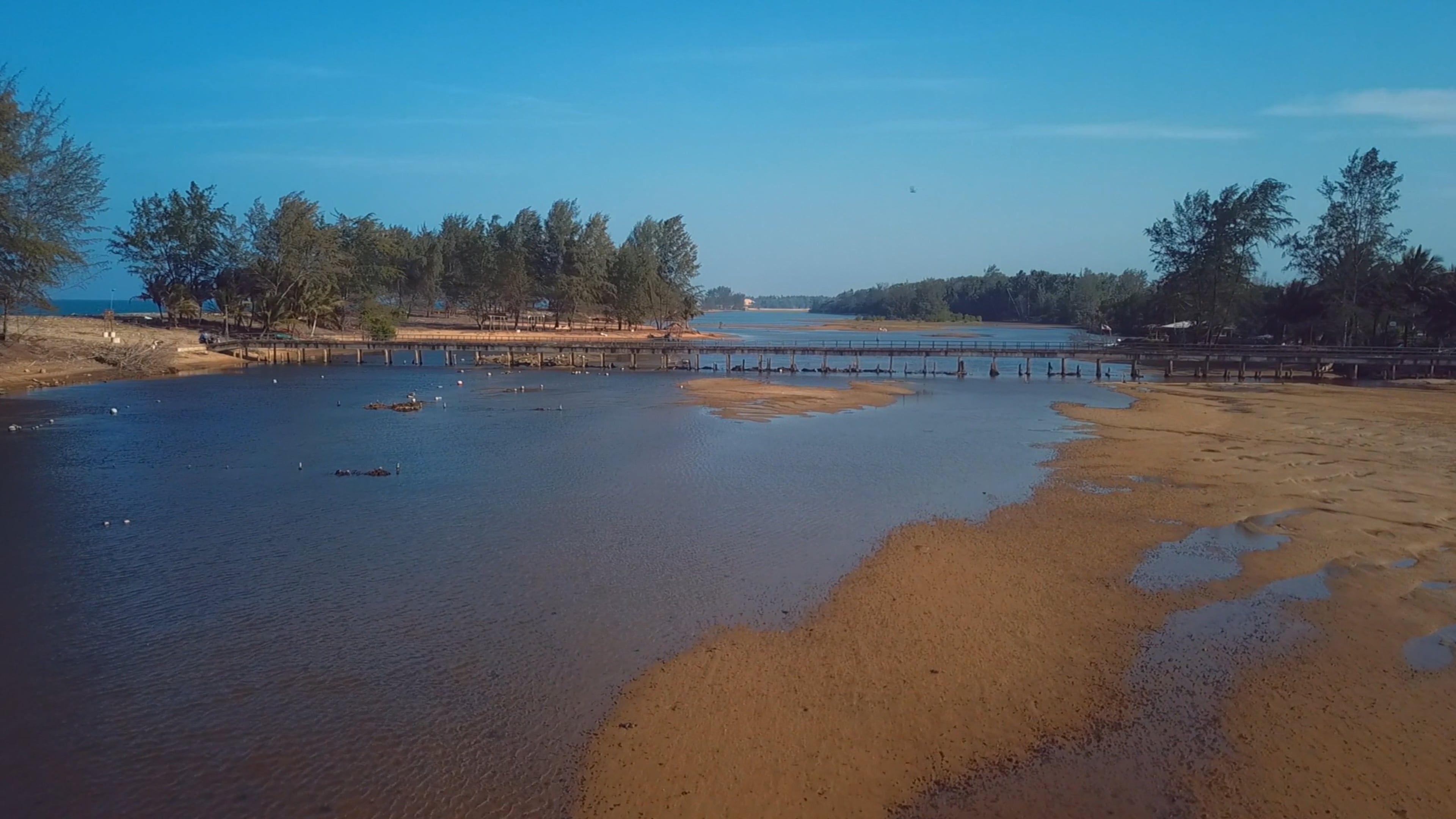 Drone Footage of a Shallow Body of Water and a Bridge Free Stock Video ...