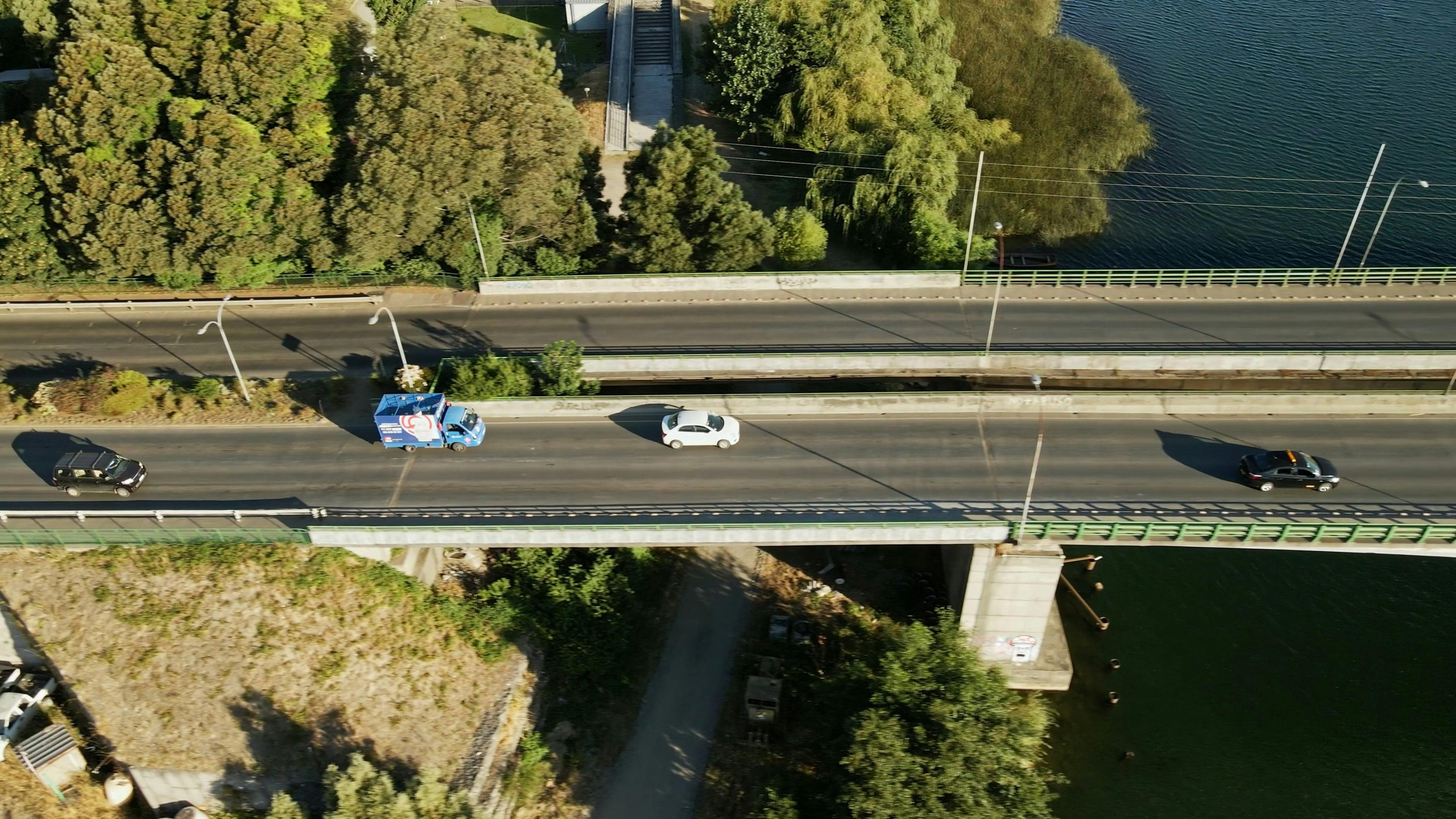 Drone Footage of Vehicles Crossing a Bridge Free Stock Video Footage ...