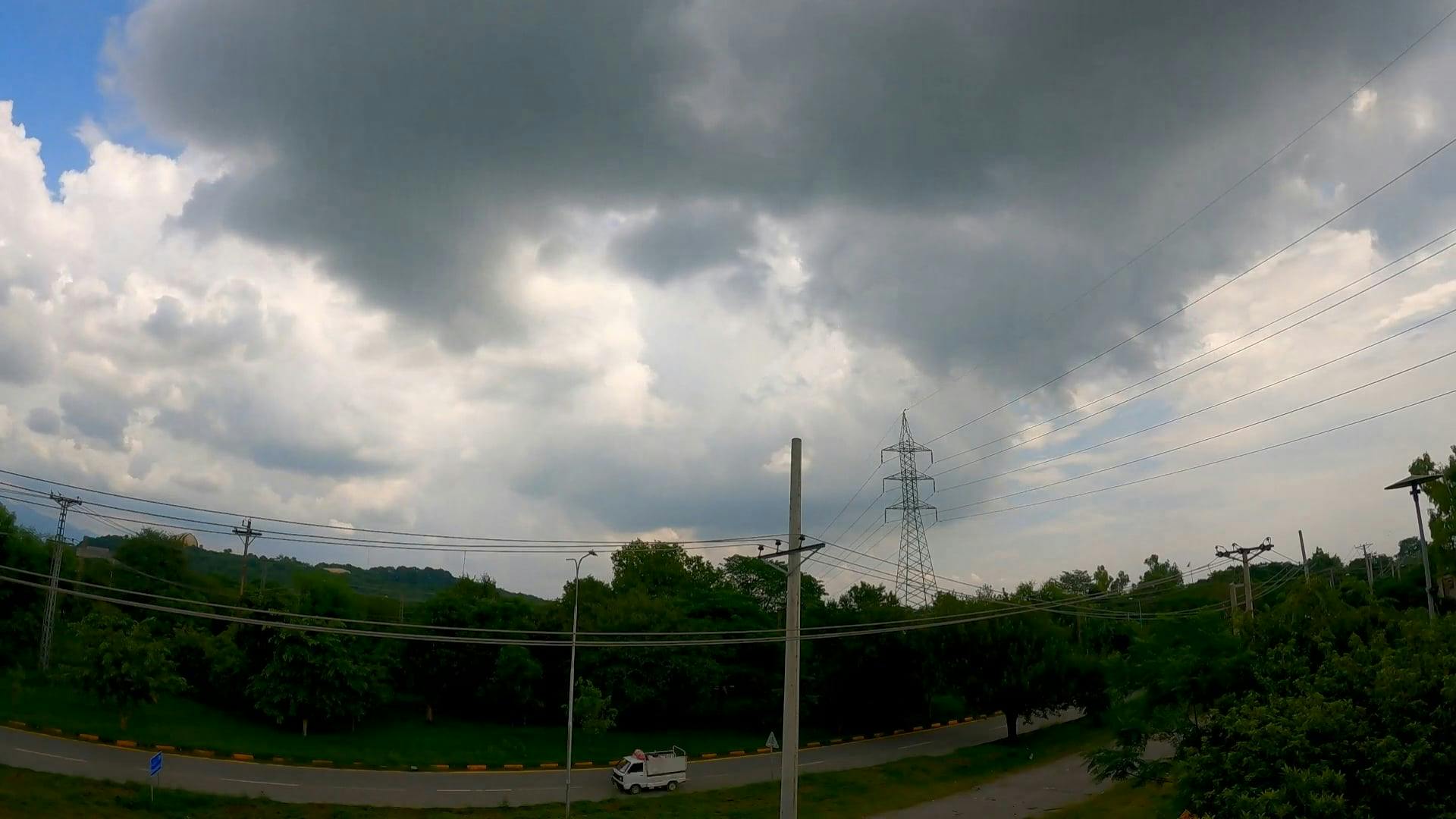 A Timelapse Video of Moving Cars on the Road Near the Green Trees Free ...