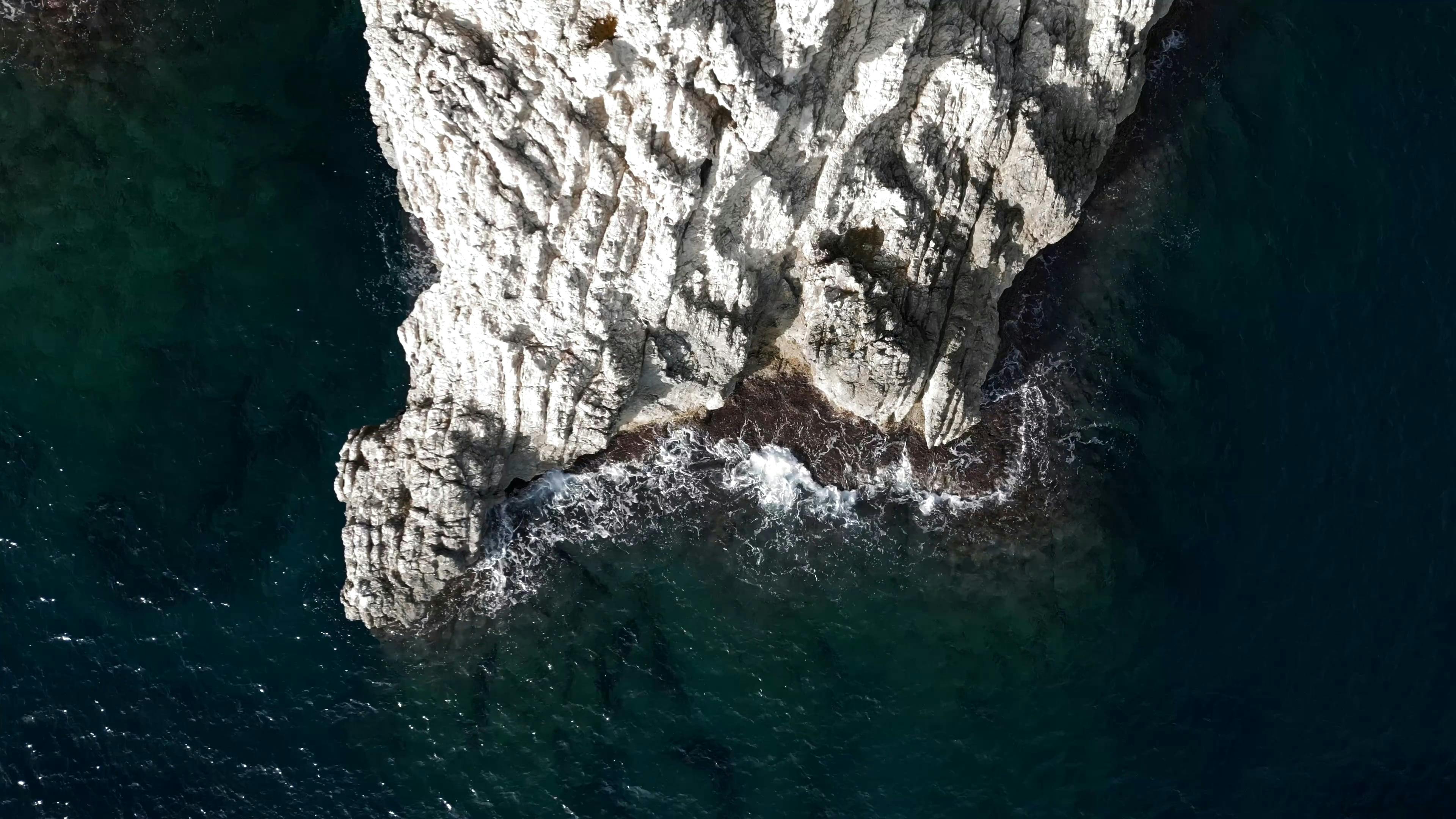 Top View of Coastal Rock Formations and Calm Sea Waters Free Stock ...