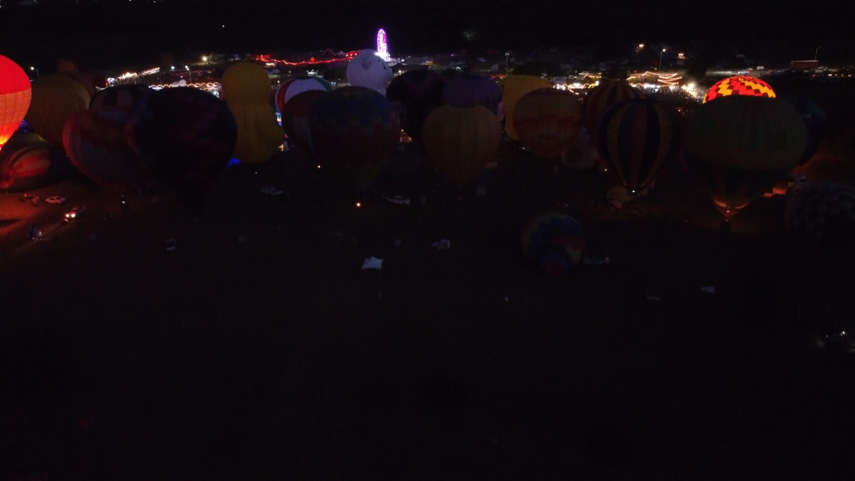 An Aerial Footage of Hot Air Balloons with Lights at Night Free Stock ...
