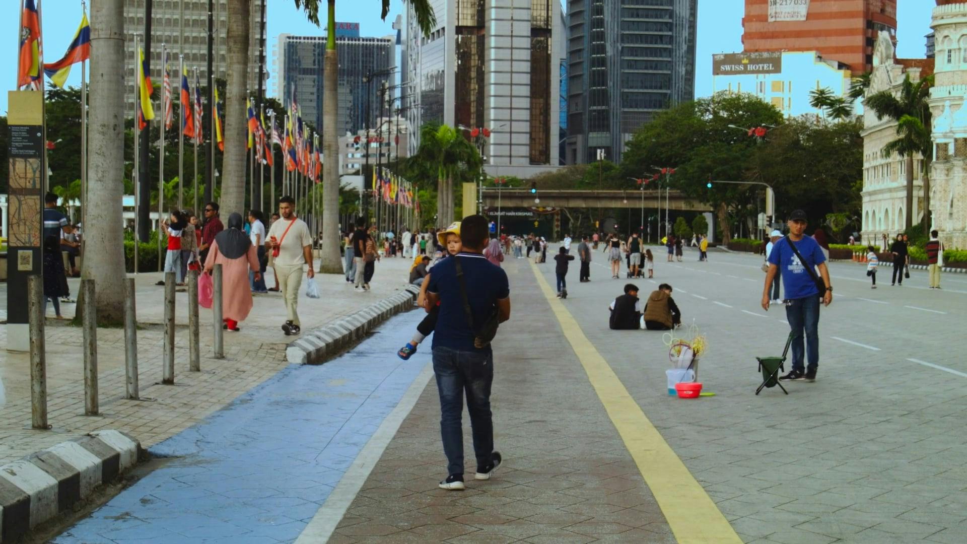 People Walking on the Street Near the Buildings Free Stock Video ...
