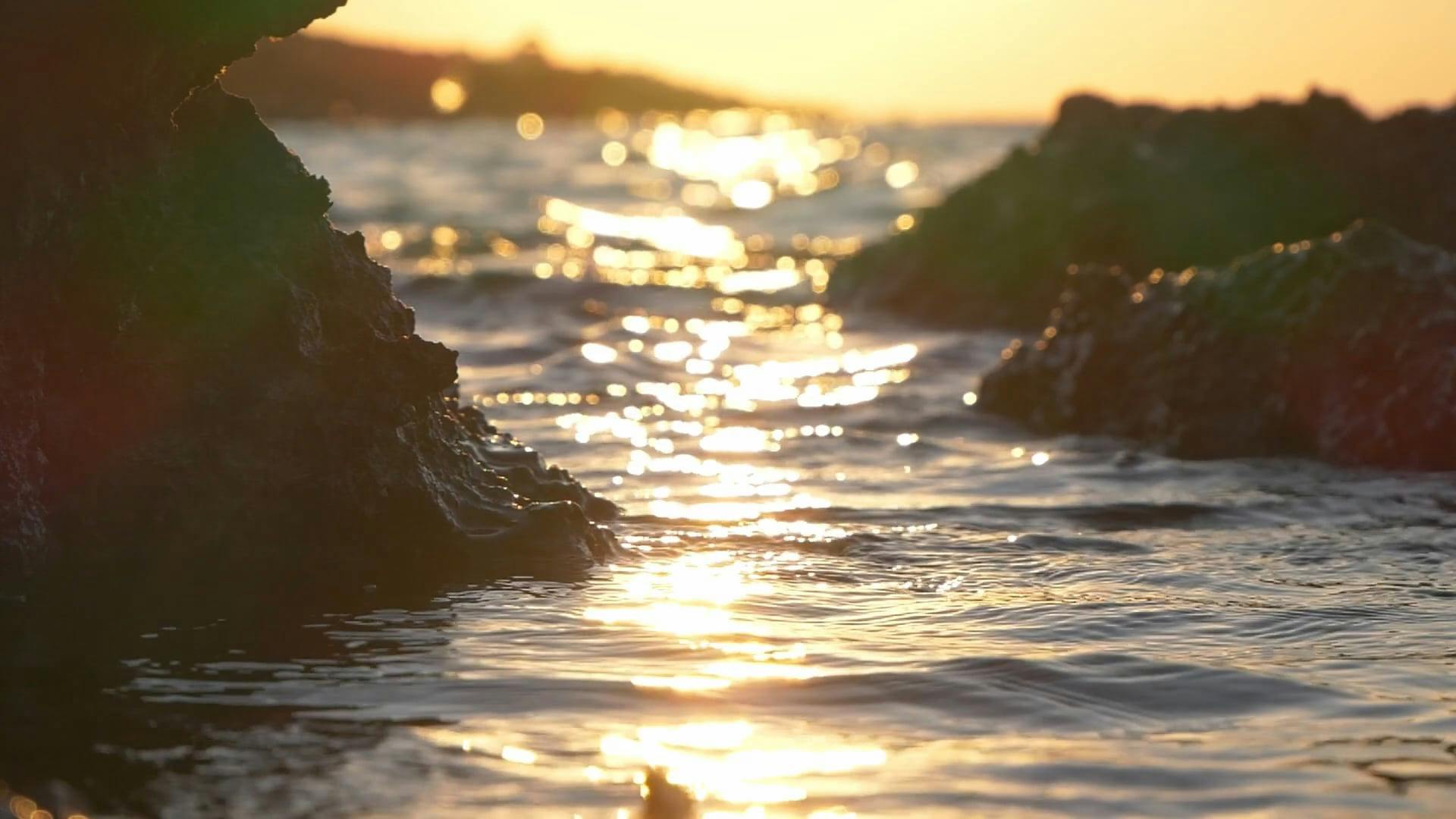 Golden Sunrise Reflection on Calm Sea Surface in Slow Motion Free Stock ...