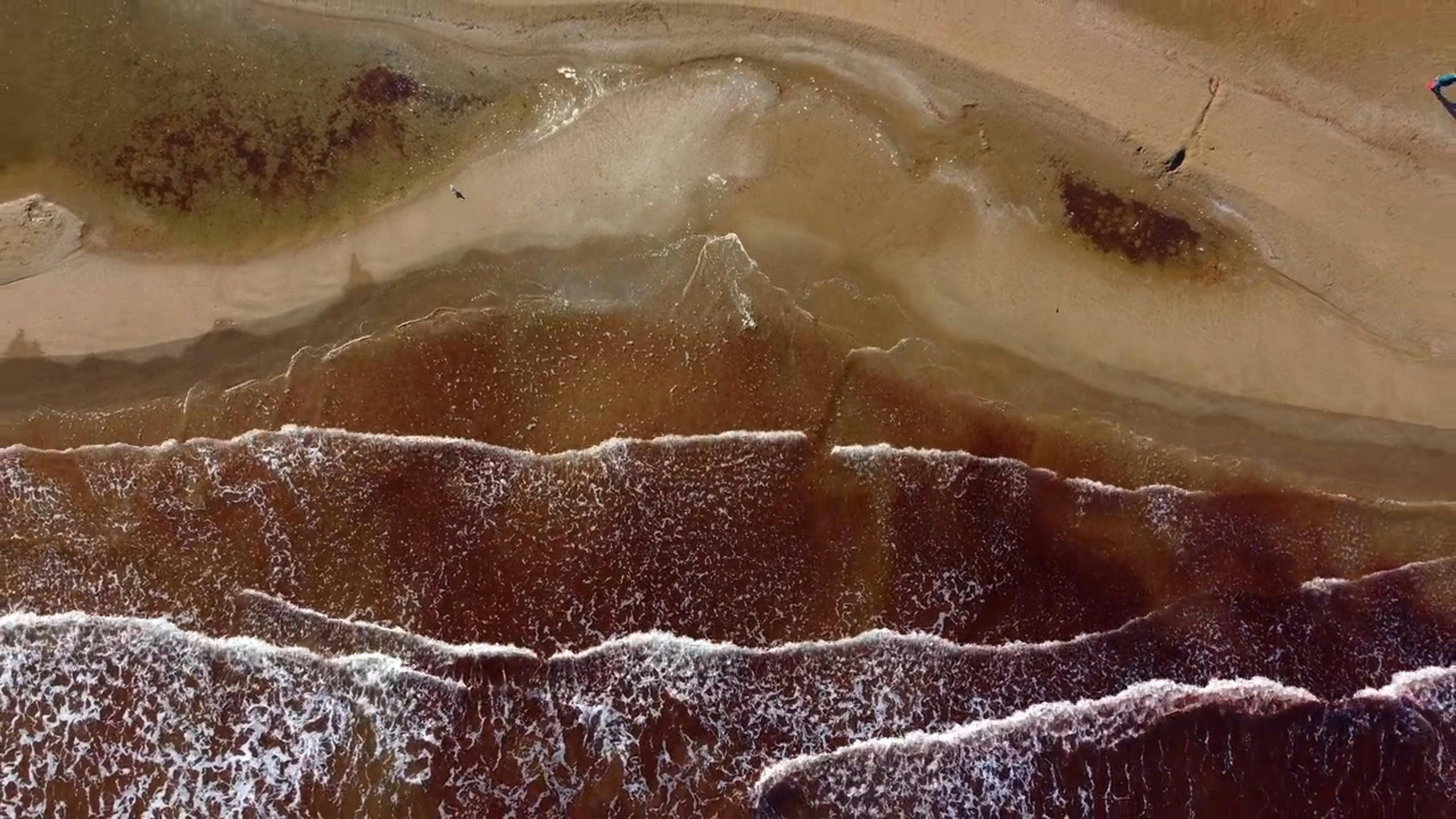 Top View of Waves Reaching the Shore of a Sandy Beach in Valencia ...