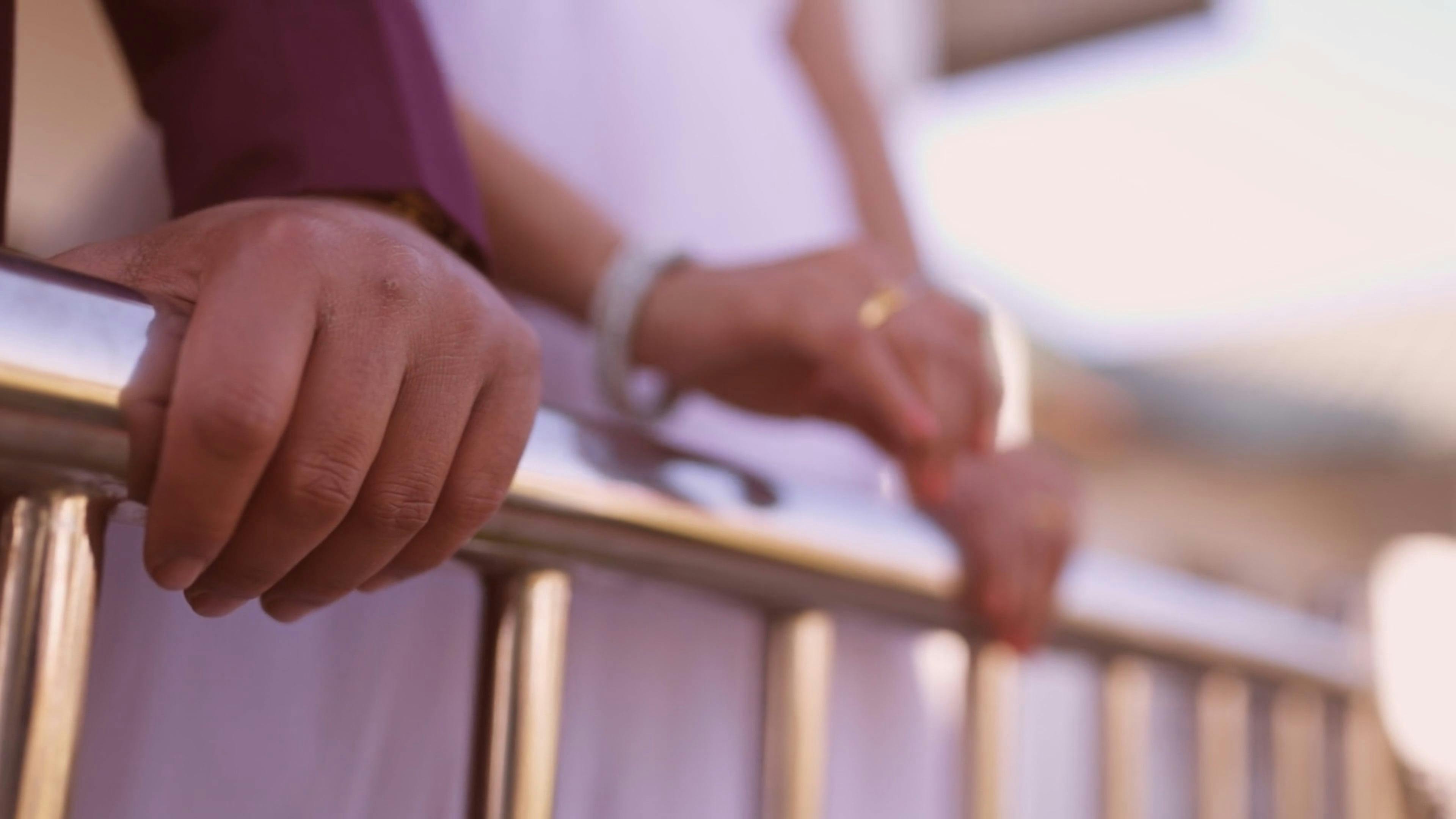 Person Walking While Holding On A Railing Free Stock Video Footage ...