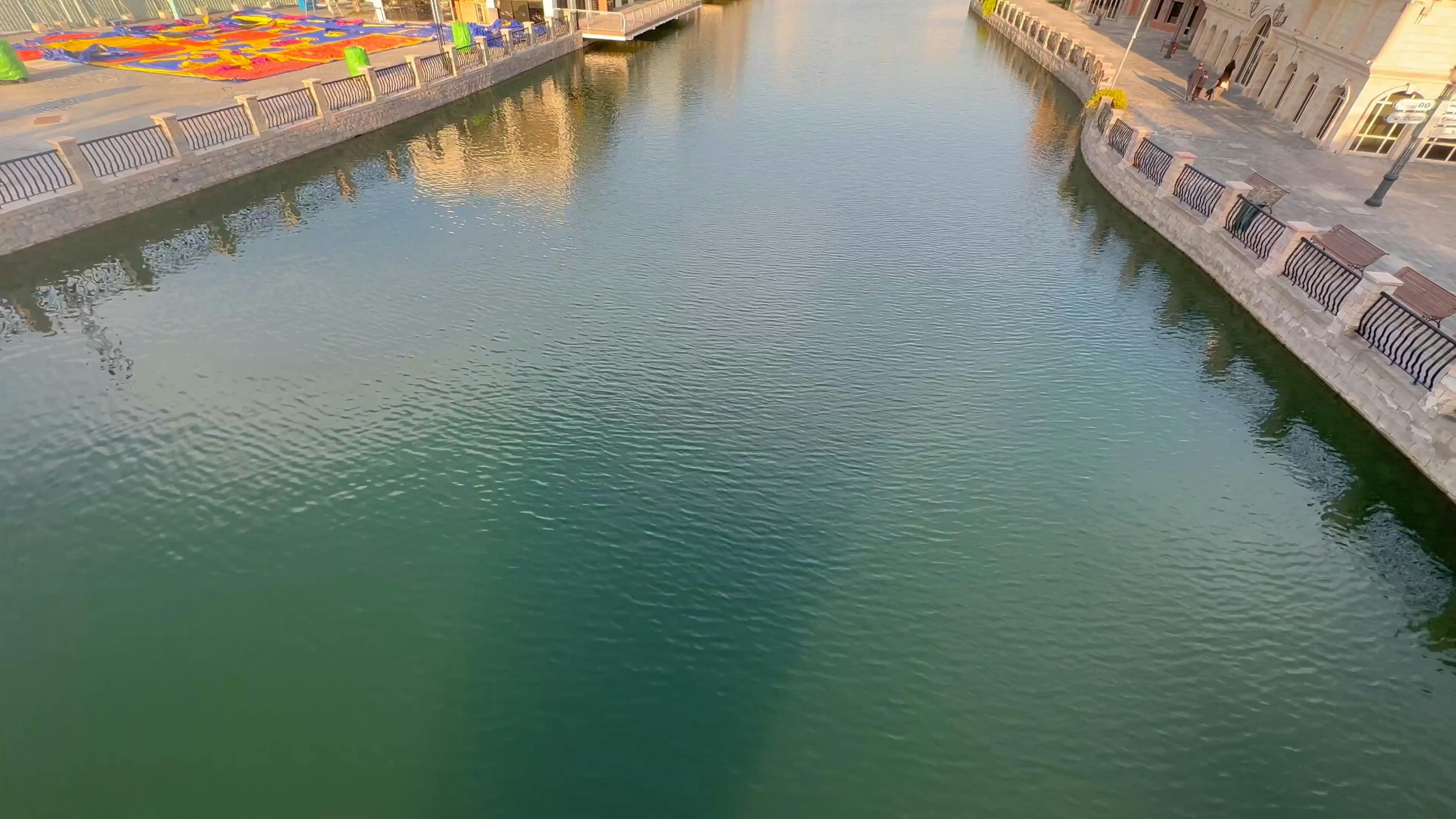 Drone Footage of a Canal between Buildings Free Stock Video Footage ...