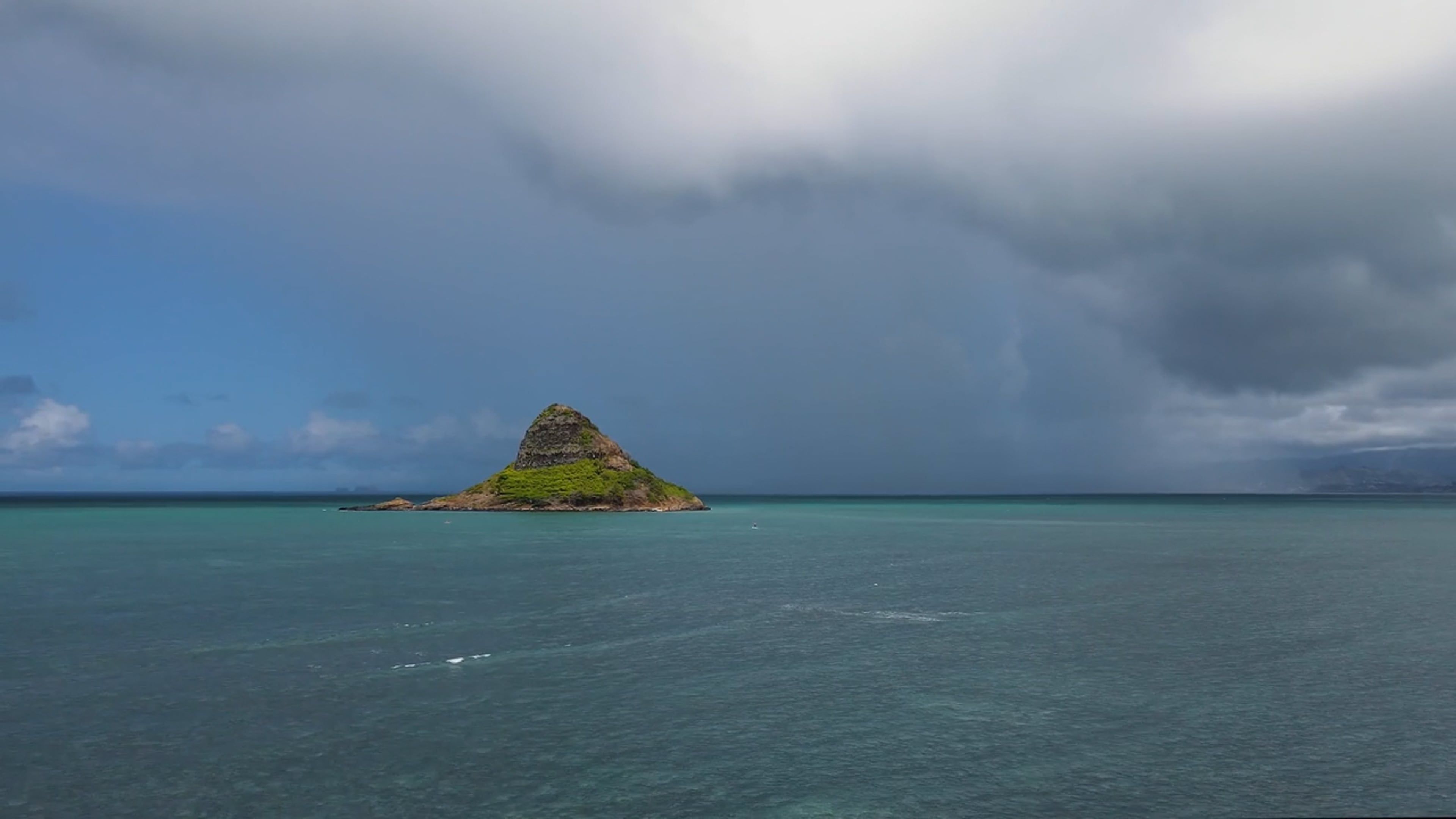 An Aerial Footage of a Chinaman's Hat Island Between the Sea Free Stock ...