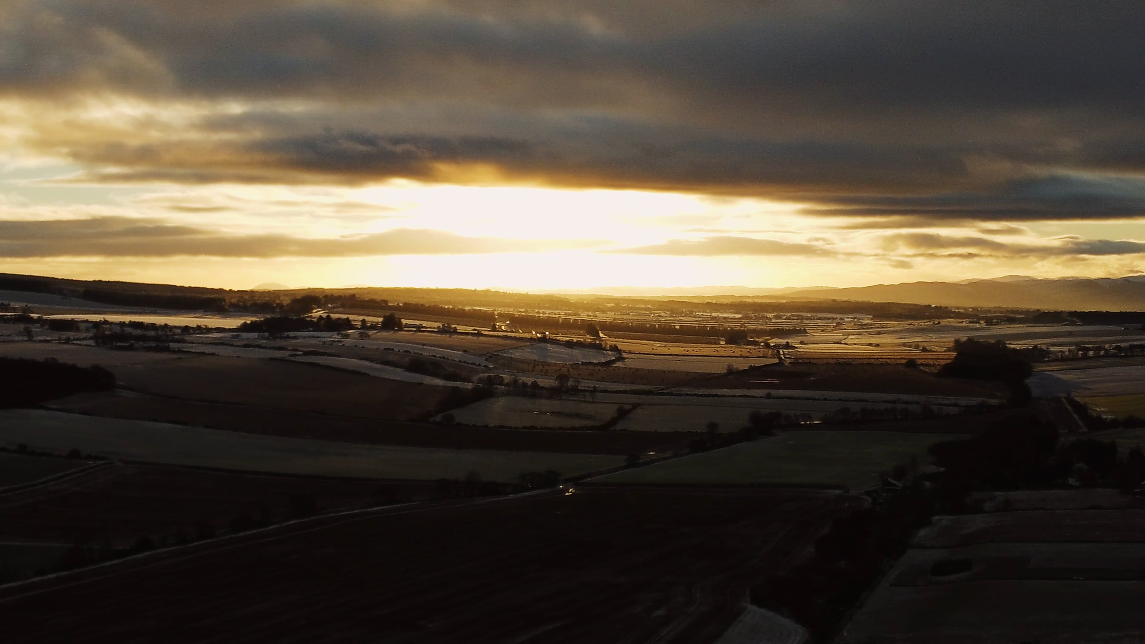 Drone Footage of Bright Sunset over Fields Free Stock Video Footage ...