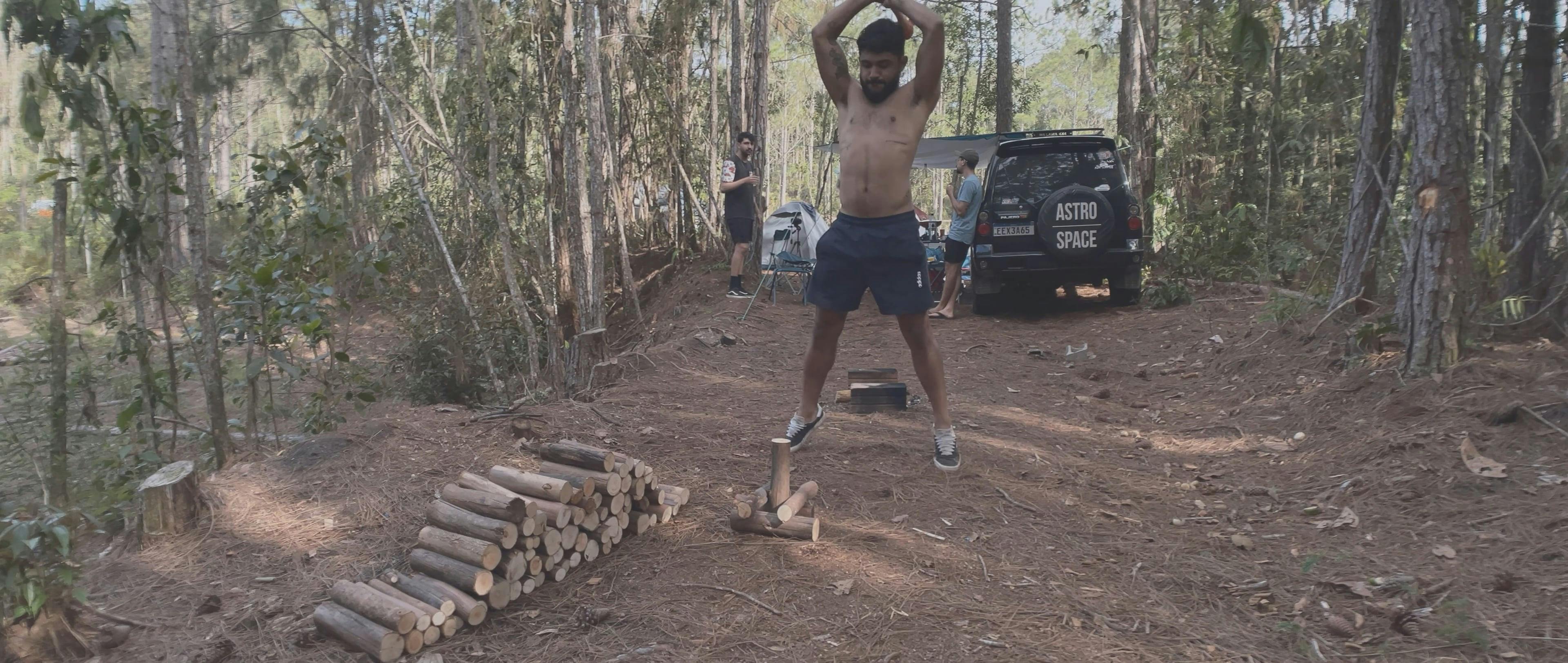 A Young Man Splitting Wood at a Campsite Free Stock Video Footage ...