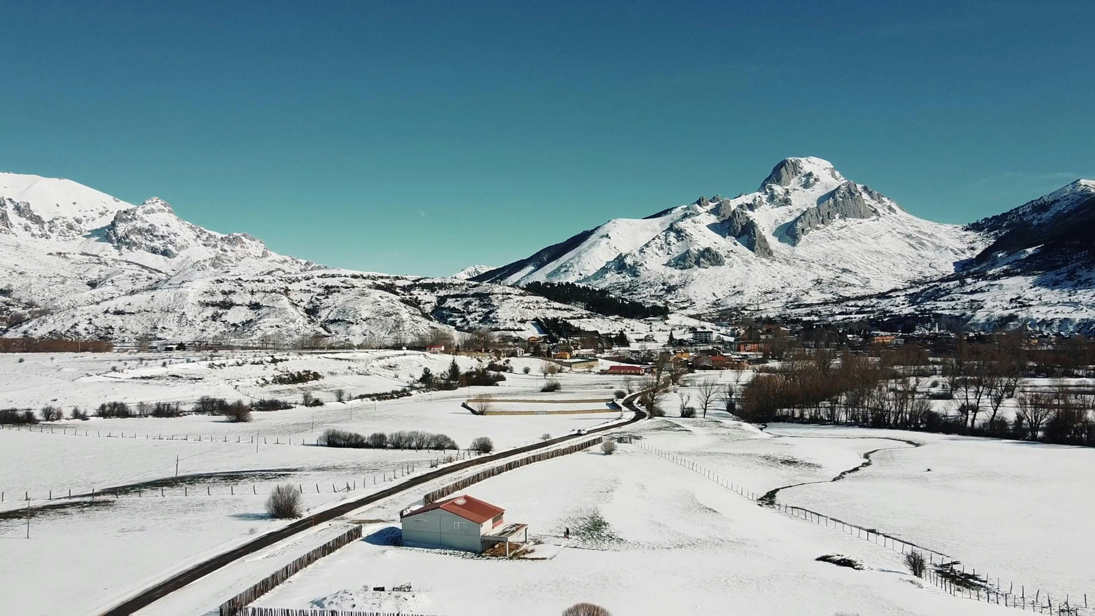 Drone Footage of a Country Road in a Winter Landscape Free Stock Video ...