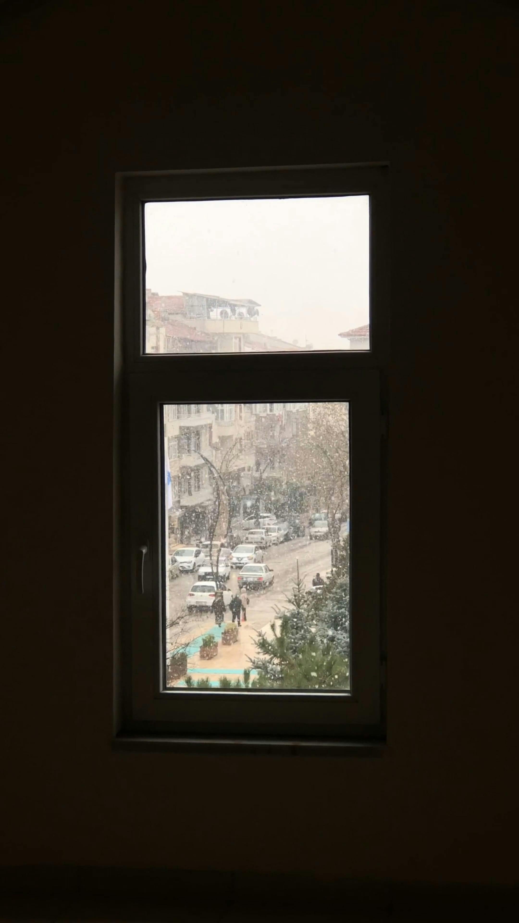 Window View of a Busy Street on a Snowy Winter Day Free Stock Video ...