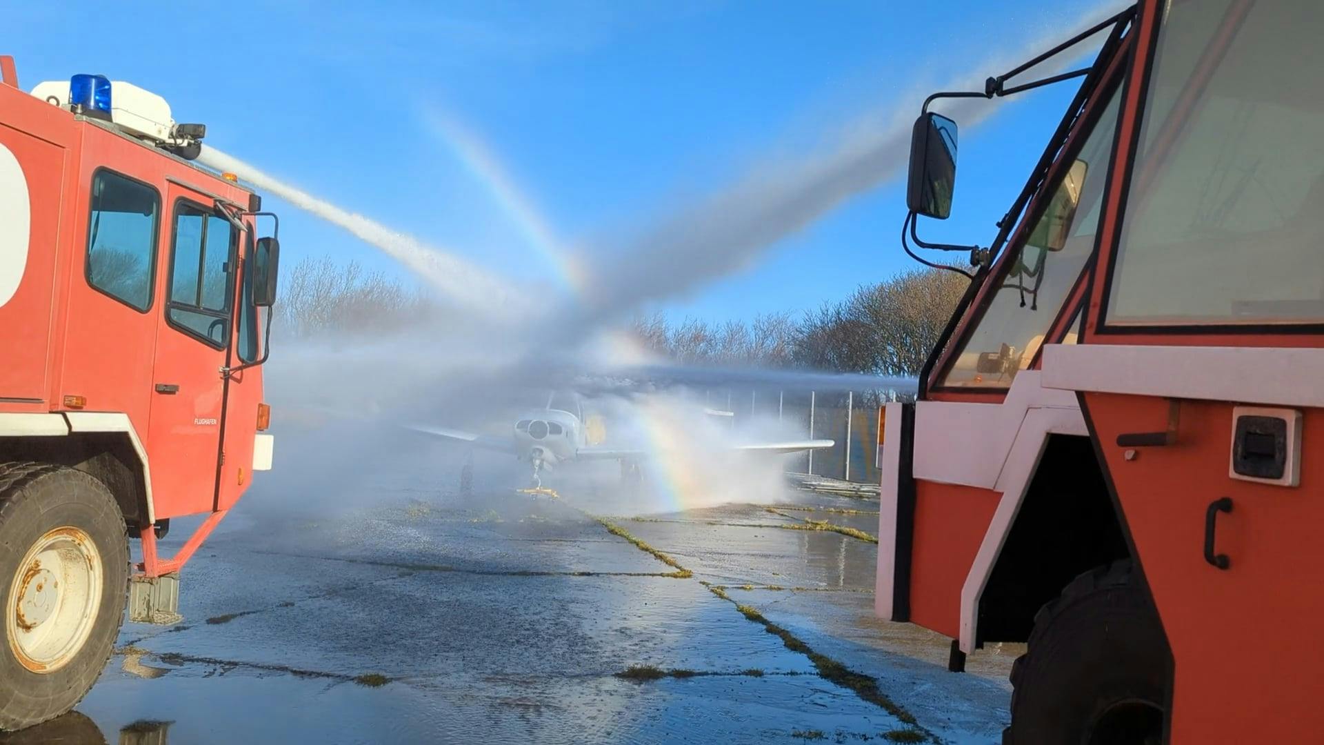 A fire truck spraying water on a runway Free Stock Video Footage ...