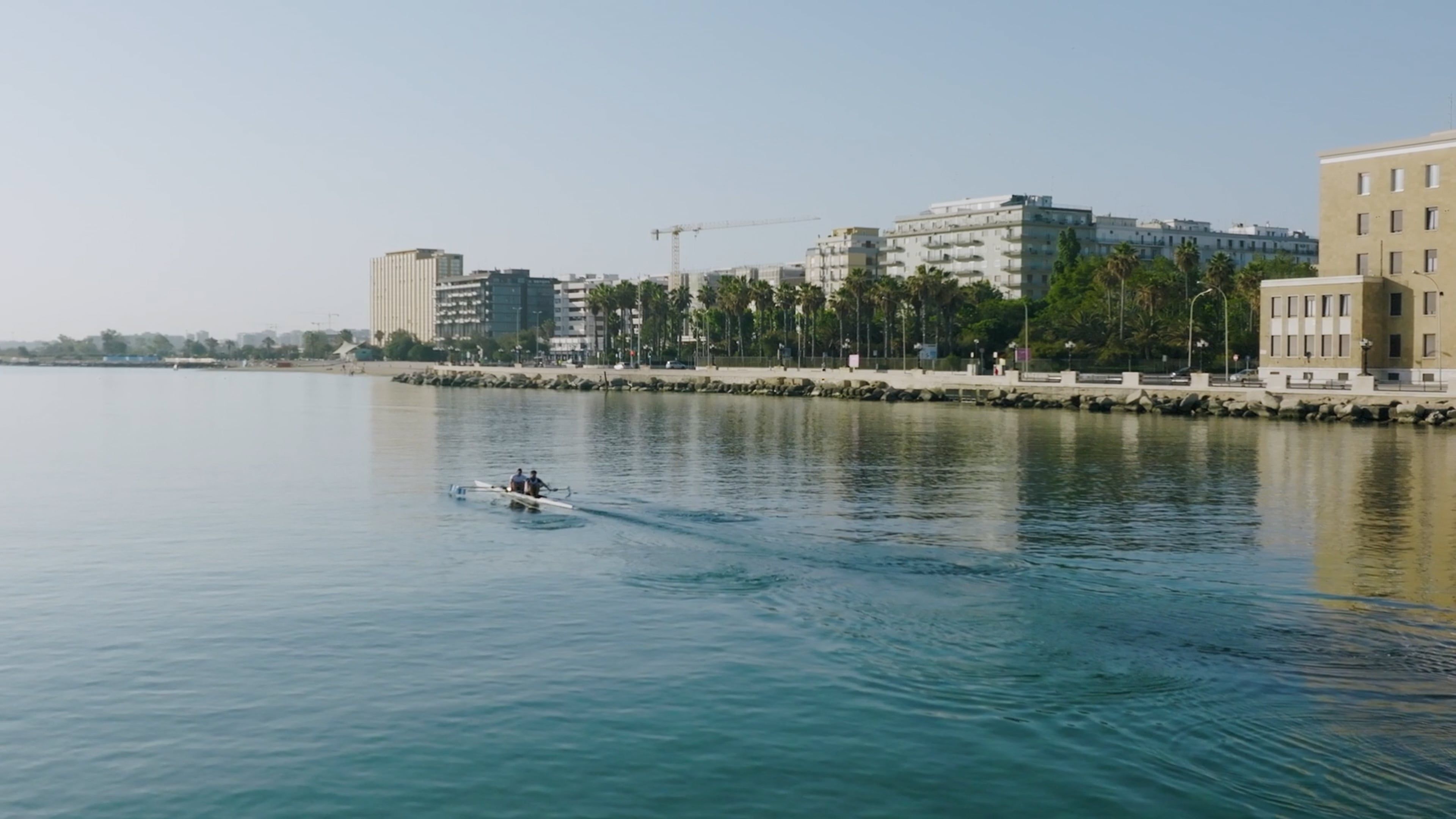 Drone Video of Two Men in a Rowing Boat near the Coast Free Stock Video ...