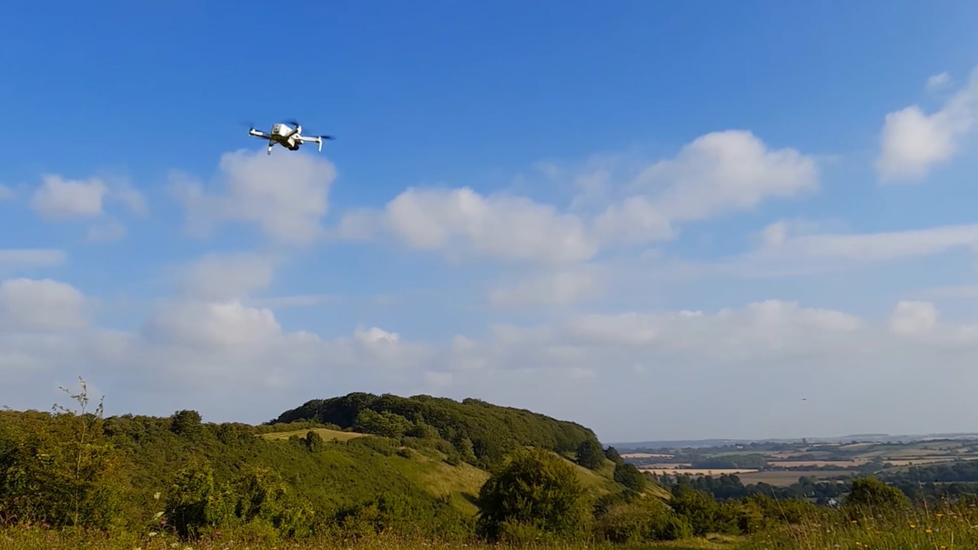 A helicopter flying over a grassy field Free Stock Video Footage ...