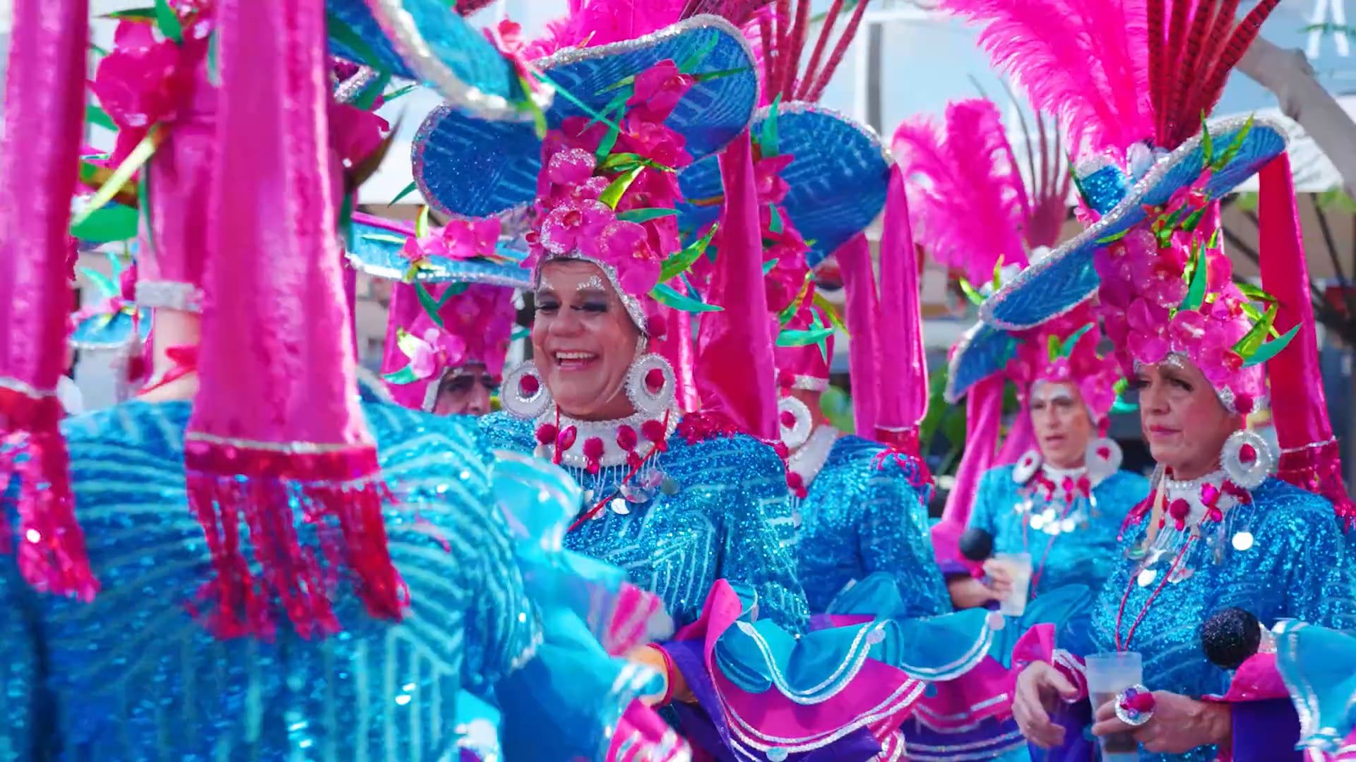 A group of people in colorful costumes at a festival Free Stock Video ...