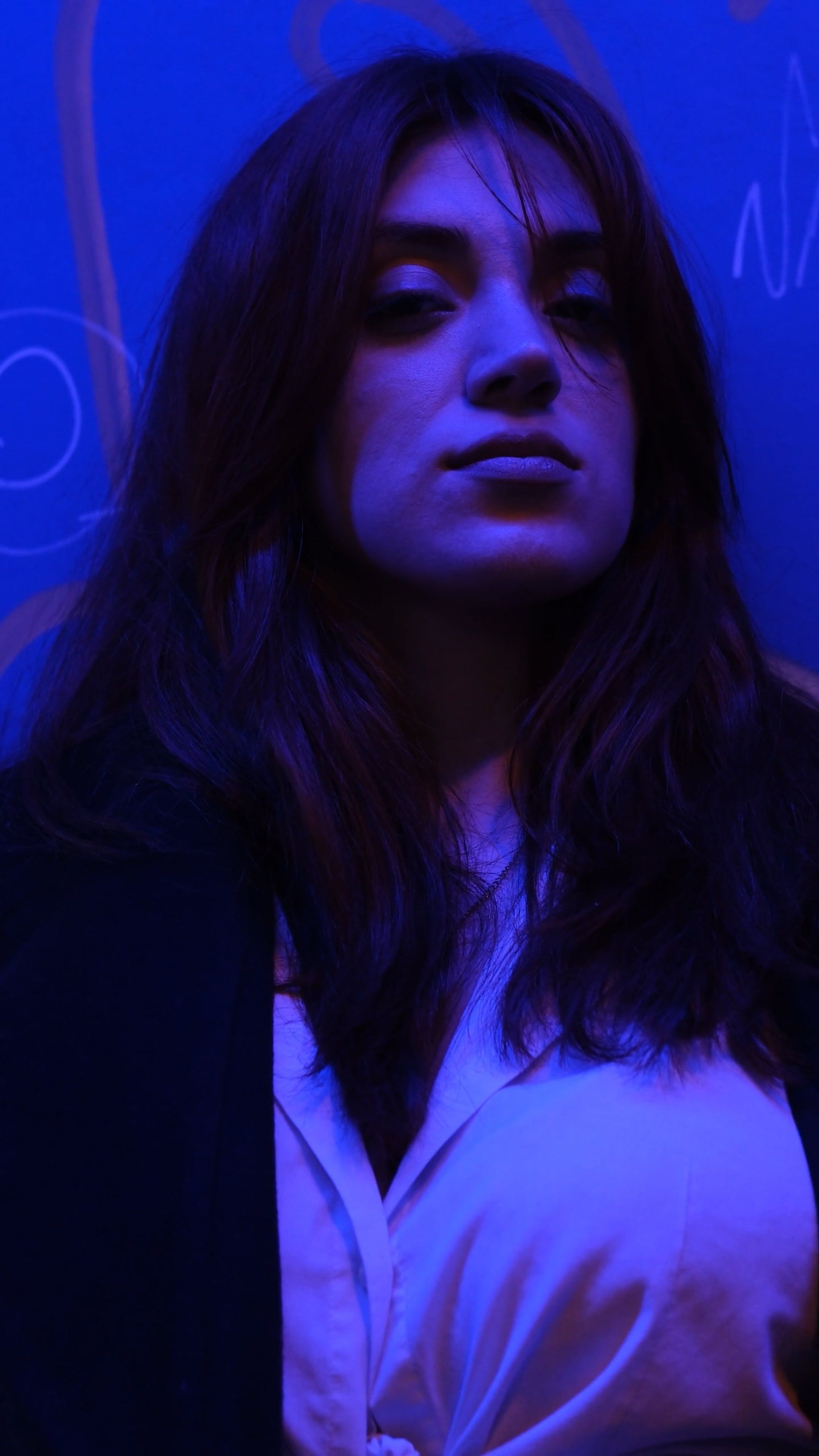 A Female Model Posing under a Blue Neon Light Free Stock Video Footage ...