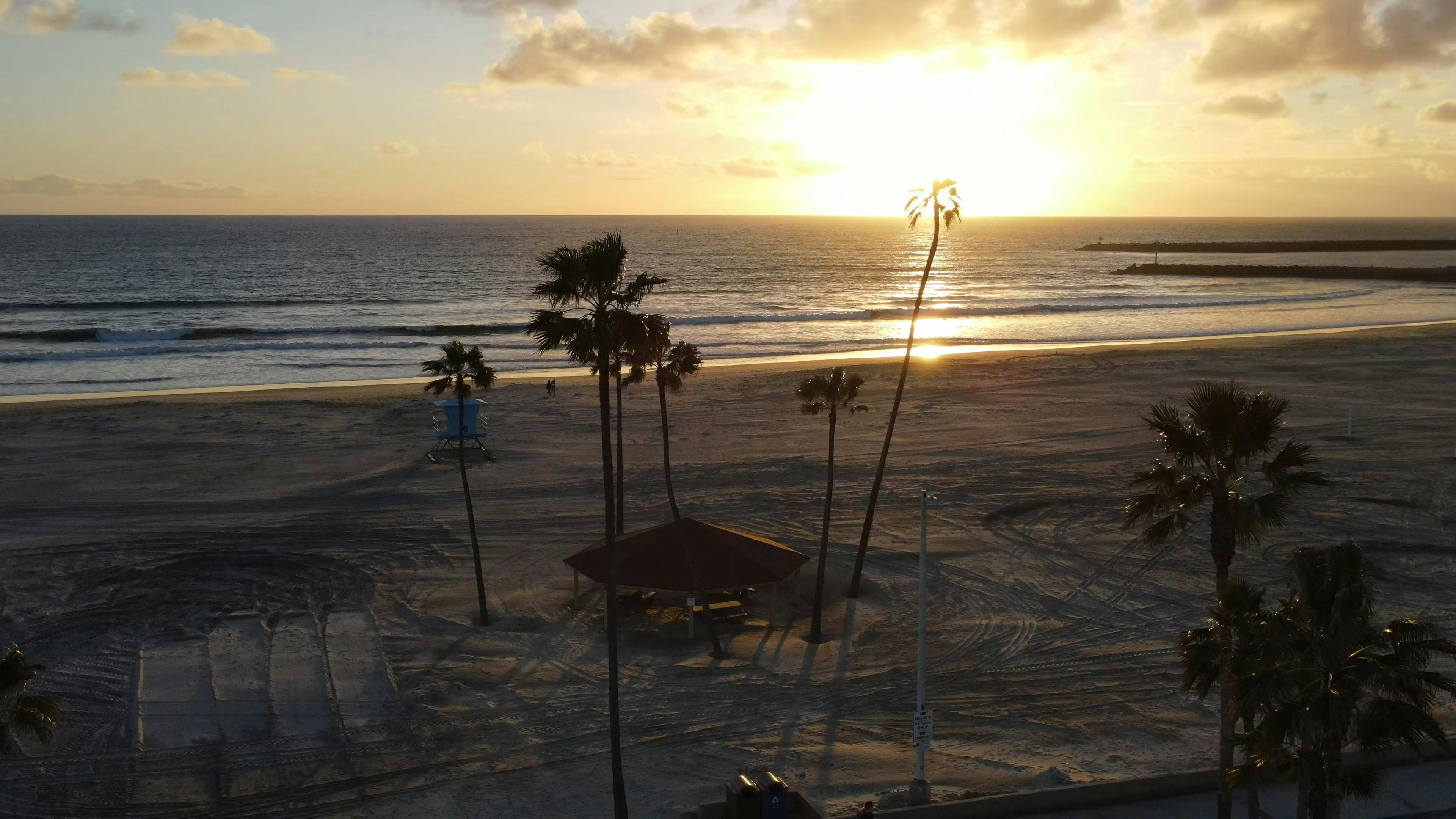 Low Angle Footage Of A Woman Walking Along The Beach Free Stock Video ...