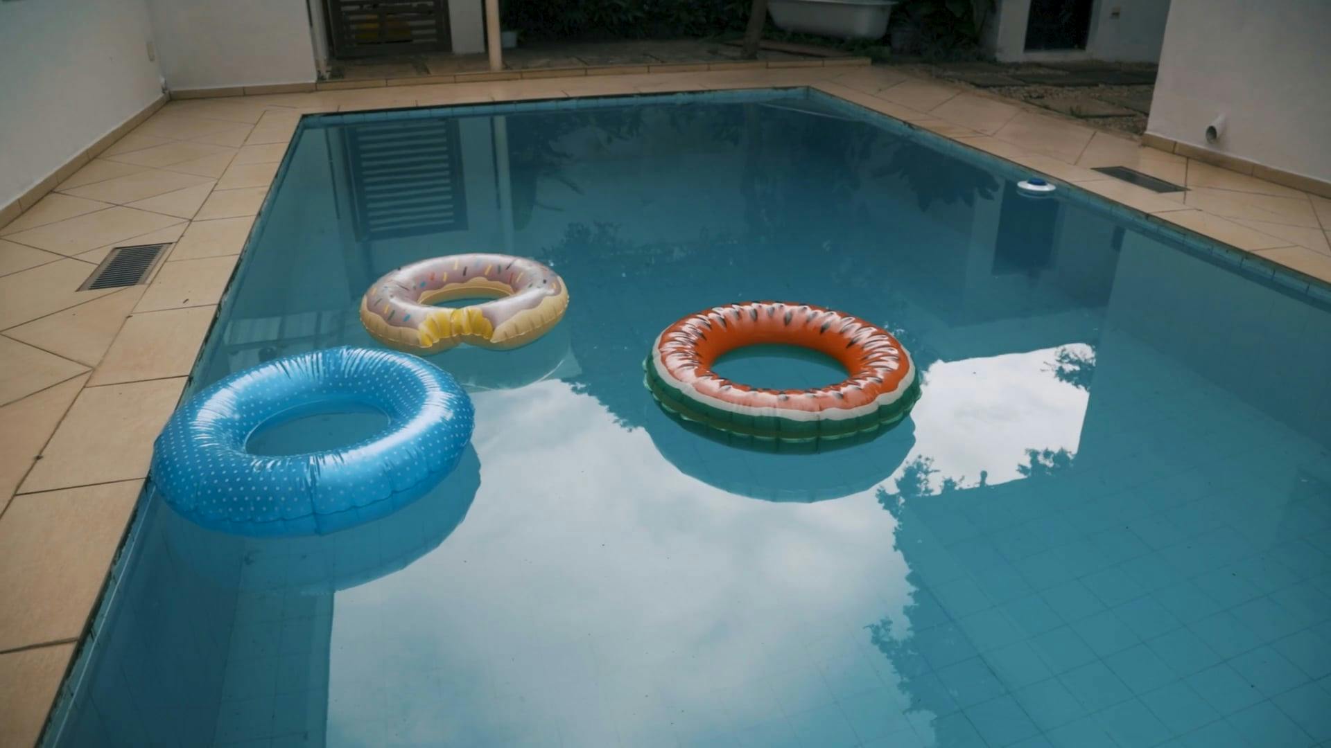 Inflatable Life Belts Floating in a Swimming Pool Free Stock Video ...