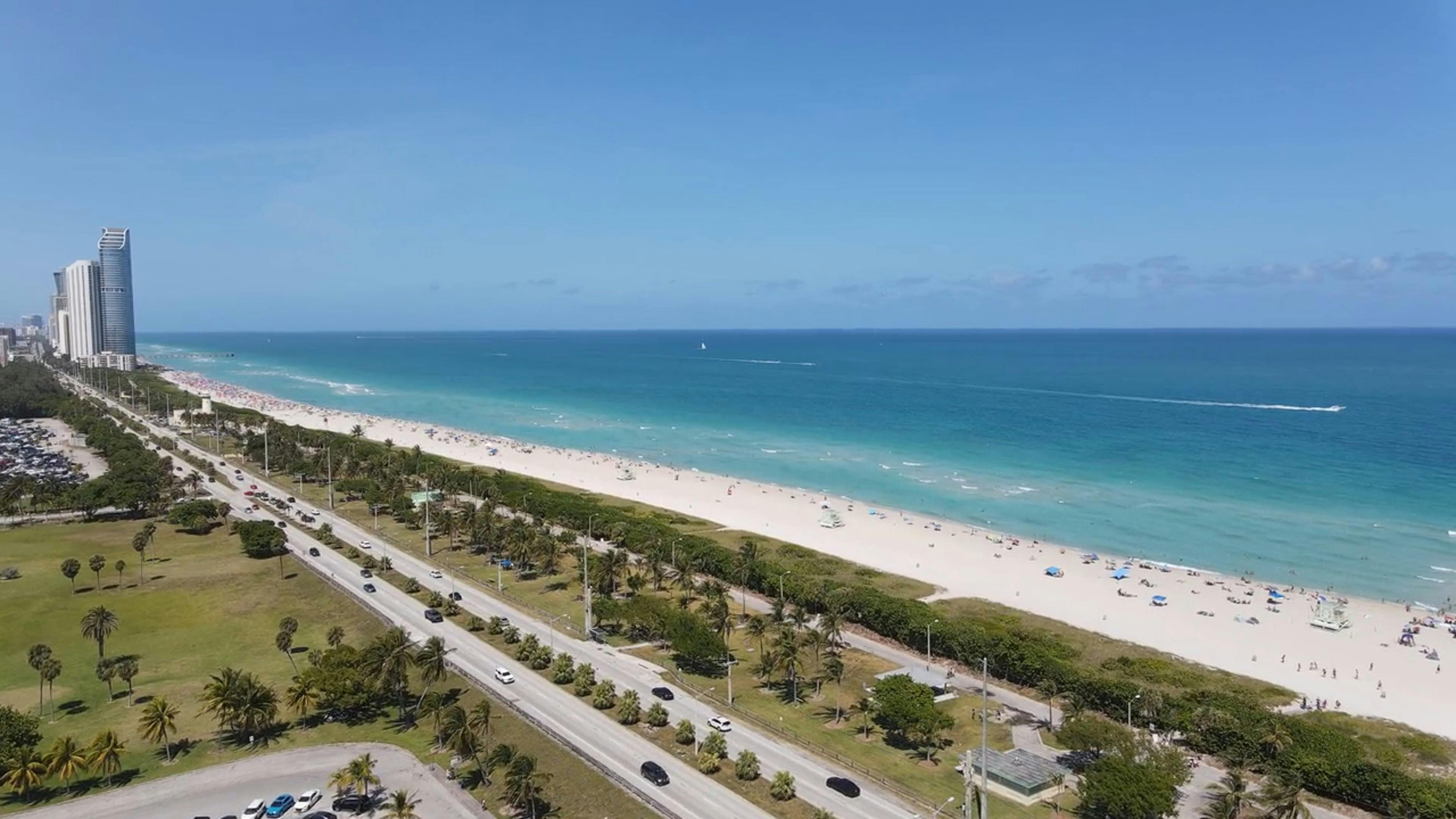 The beach and city skyline from an aerial view Free Stock Video Footage ...