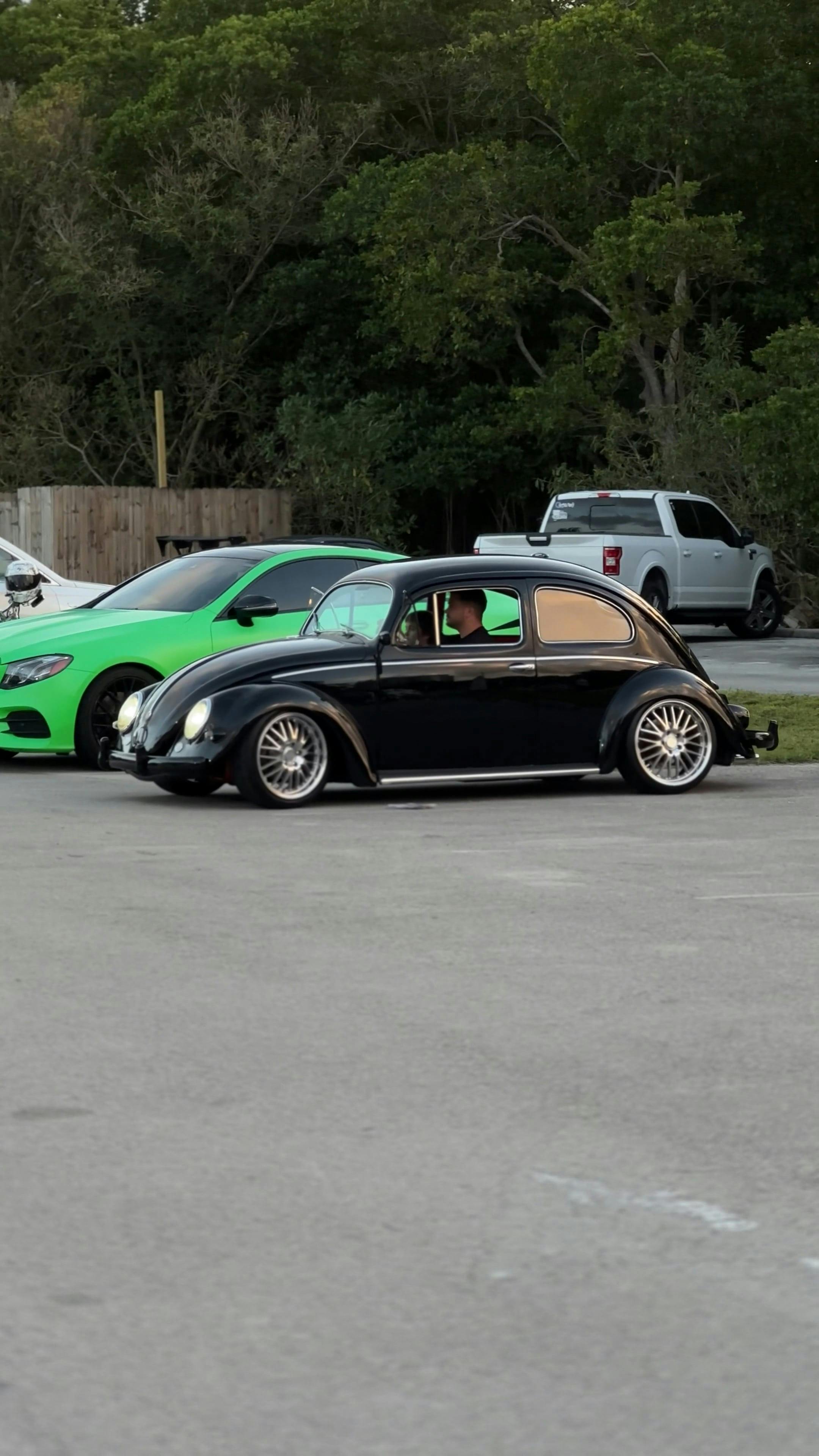 A Man Driving a Black Volkswagen Beetle Free Stock Video Footage ...
