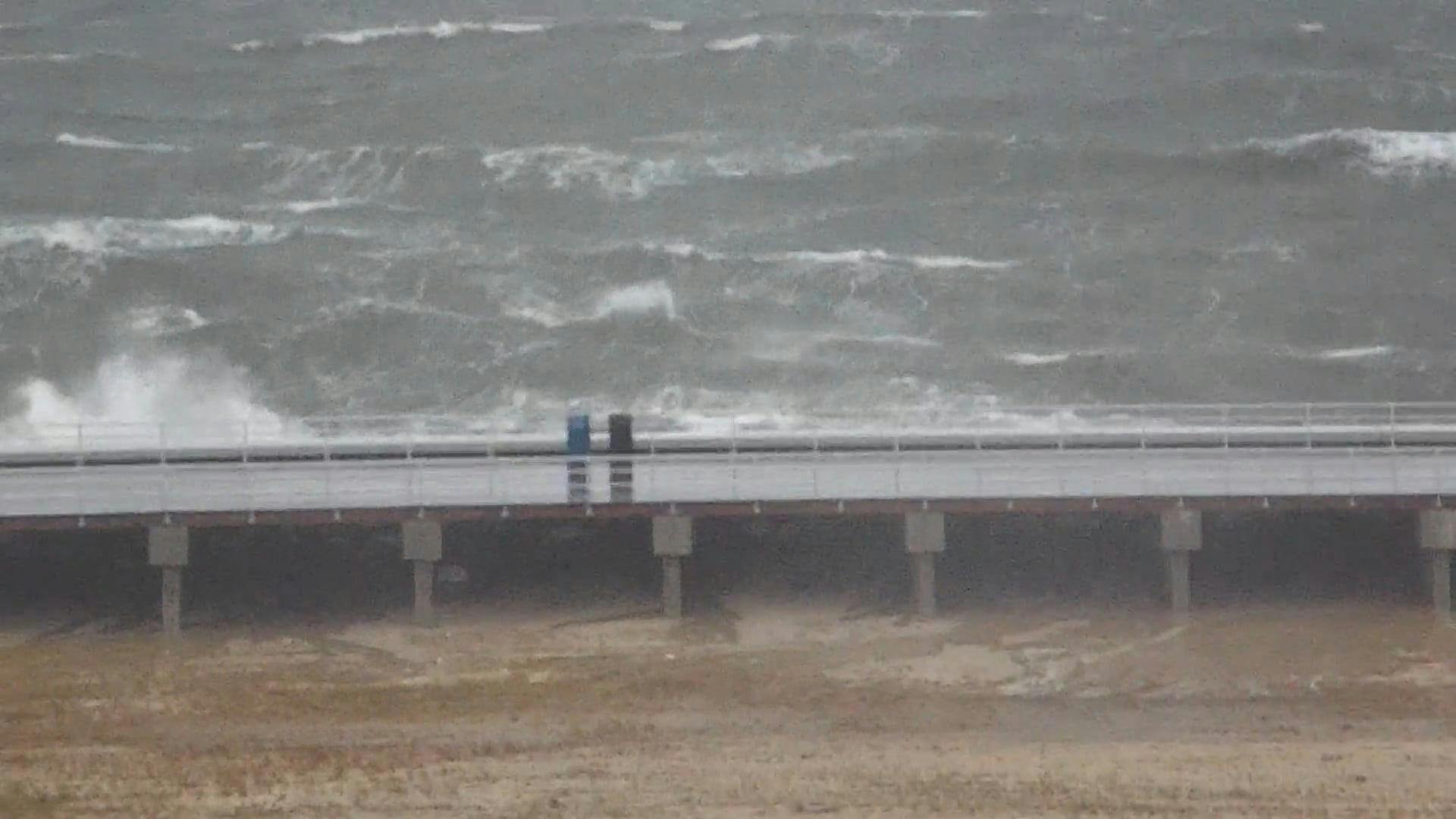 Waves Breaking Through The Bridge · Free Stock Video