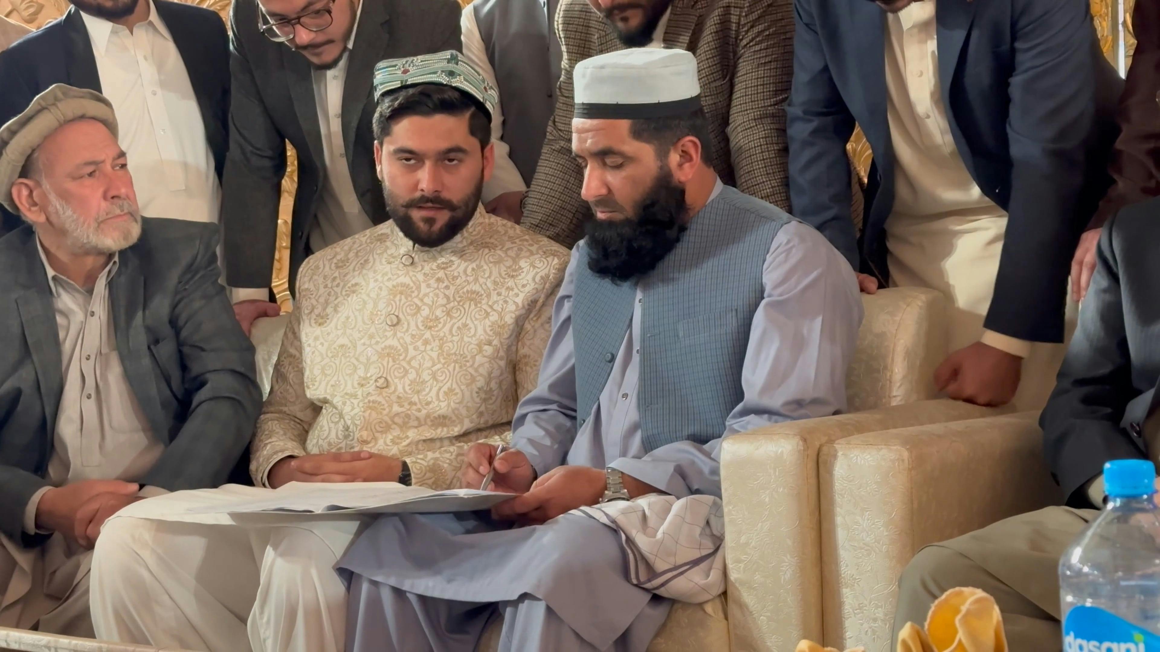 A group of men sitting around a table Free Stock Video Footage, Royalty ...